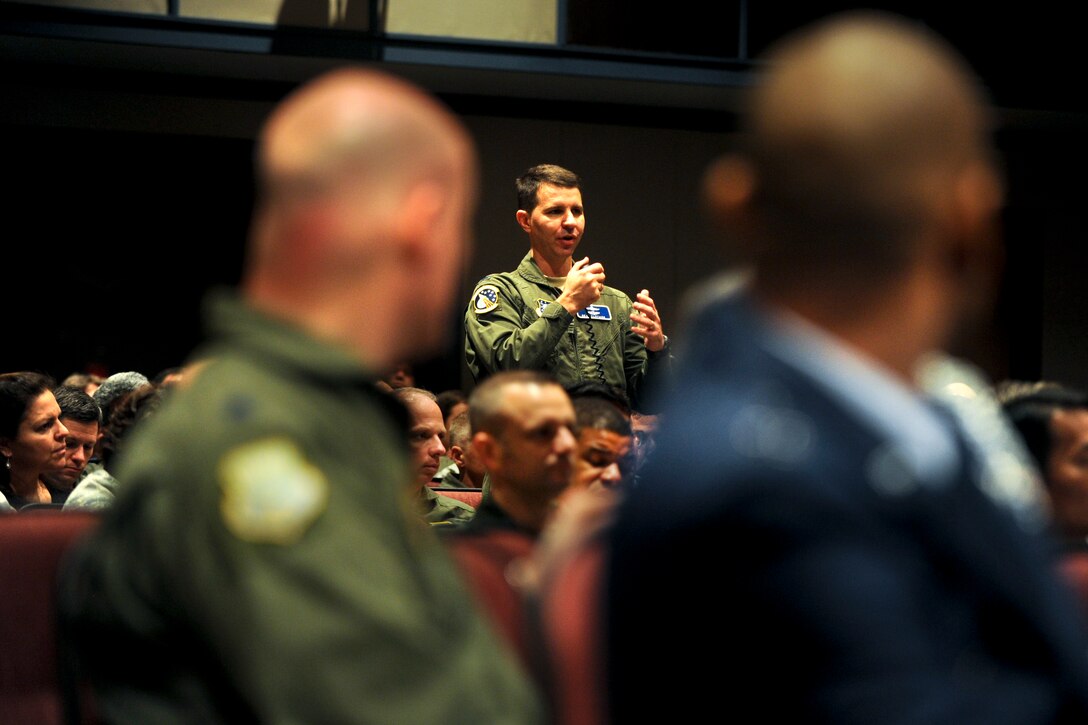 Air Force Lt. Col. Dean Clothier asks a question to Army Gen. Martin E ...