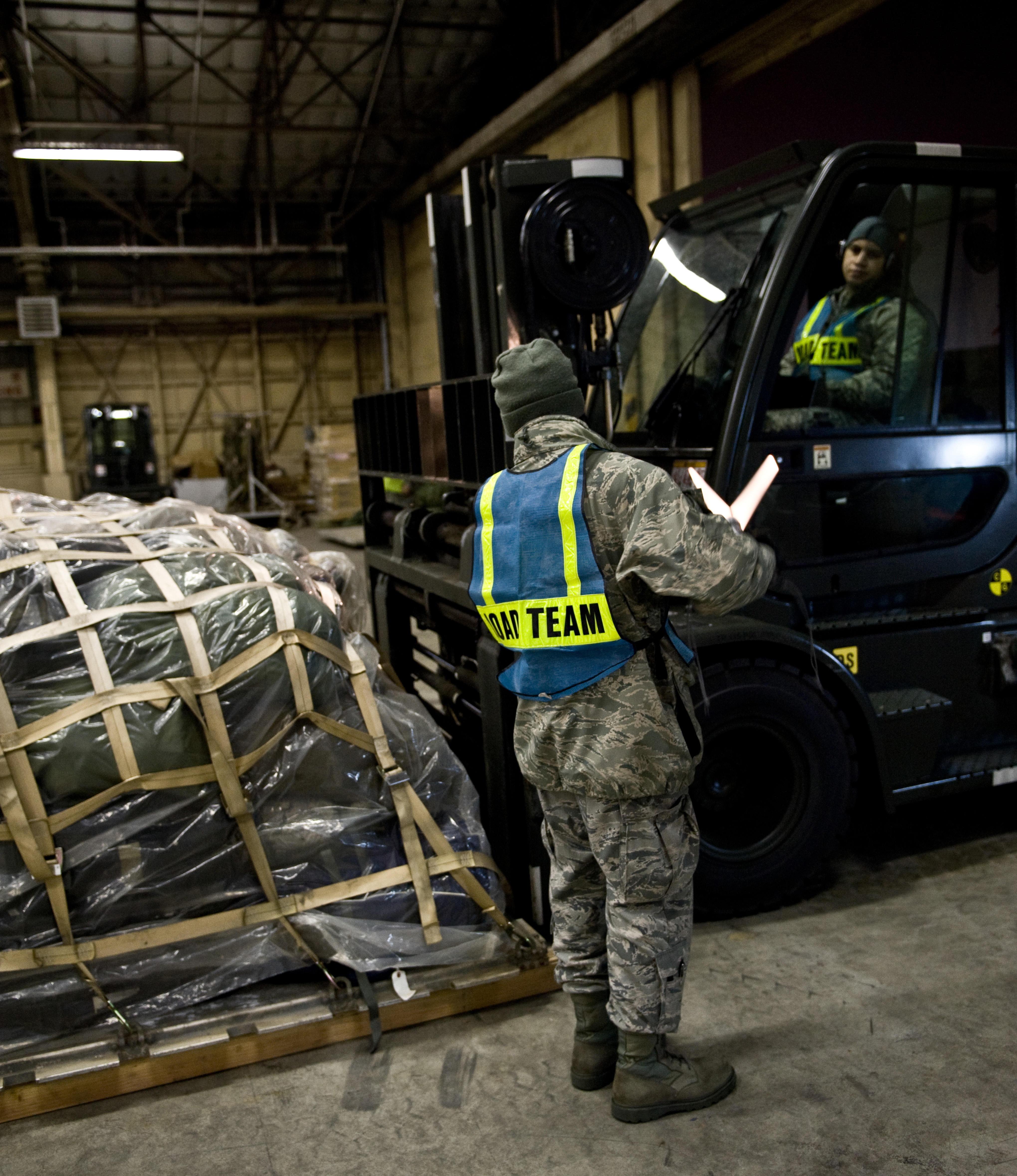 374th LRS load team prepare cargo during an ORE