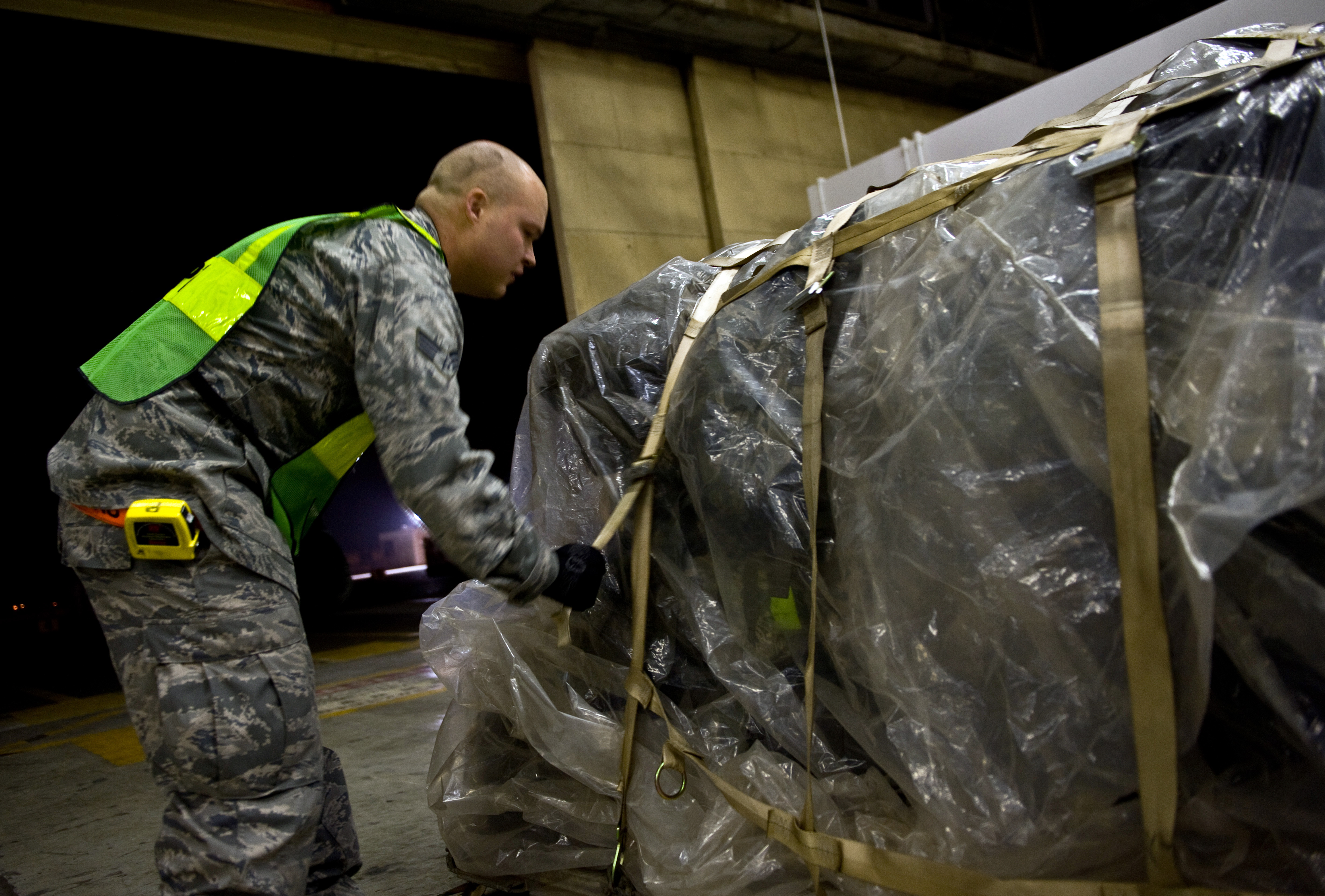 374th LRS load team prepare cargo during an ORE