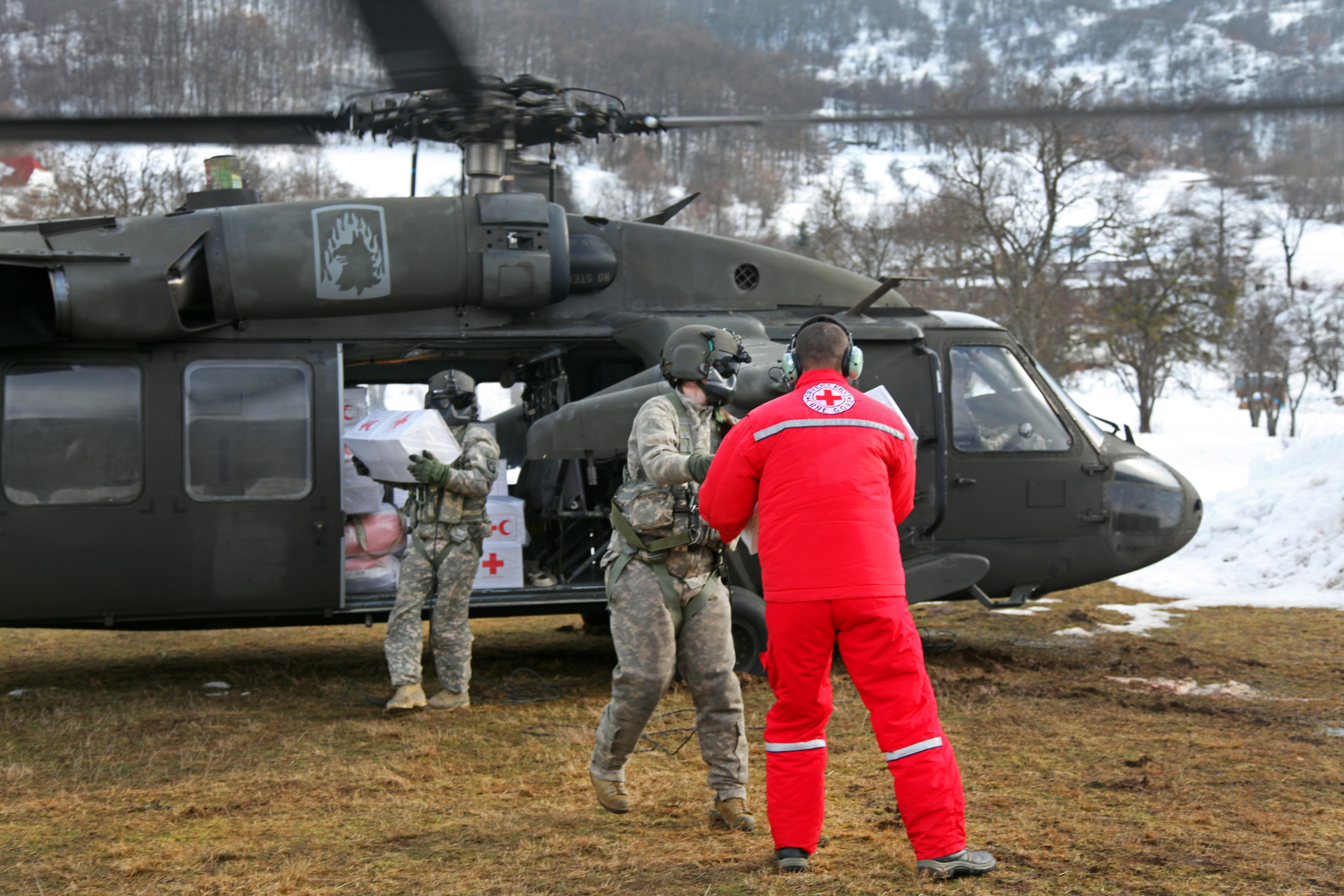 U.S. soldiers conduct a resupply mission with the Montenegrin Red Cross ...
