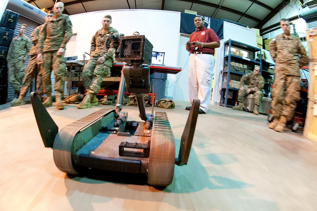 Don Thompson, a civilian trainer for the PackBot battlefield robot ...