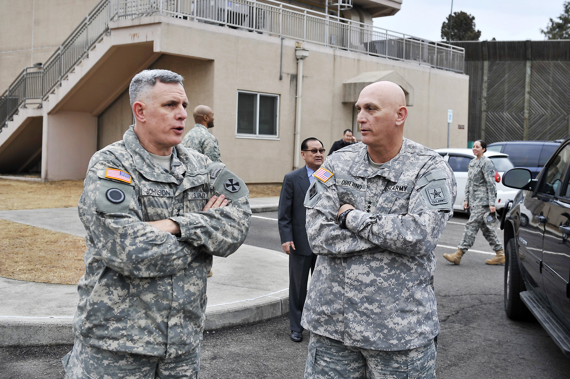 U.S. Army Lt. Gen. John D. Johnson, left, talks to U.S. Army Chief of ...