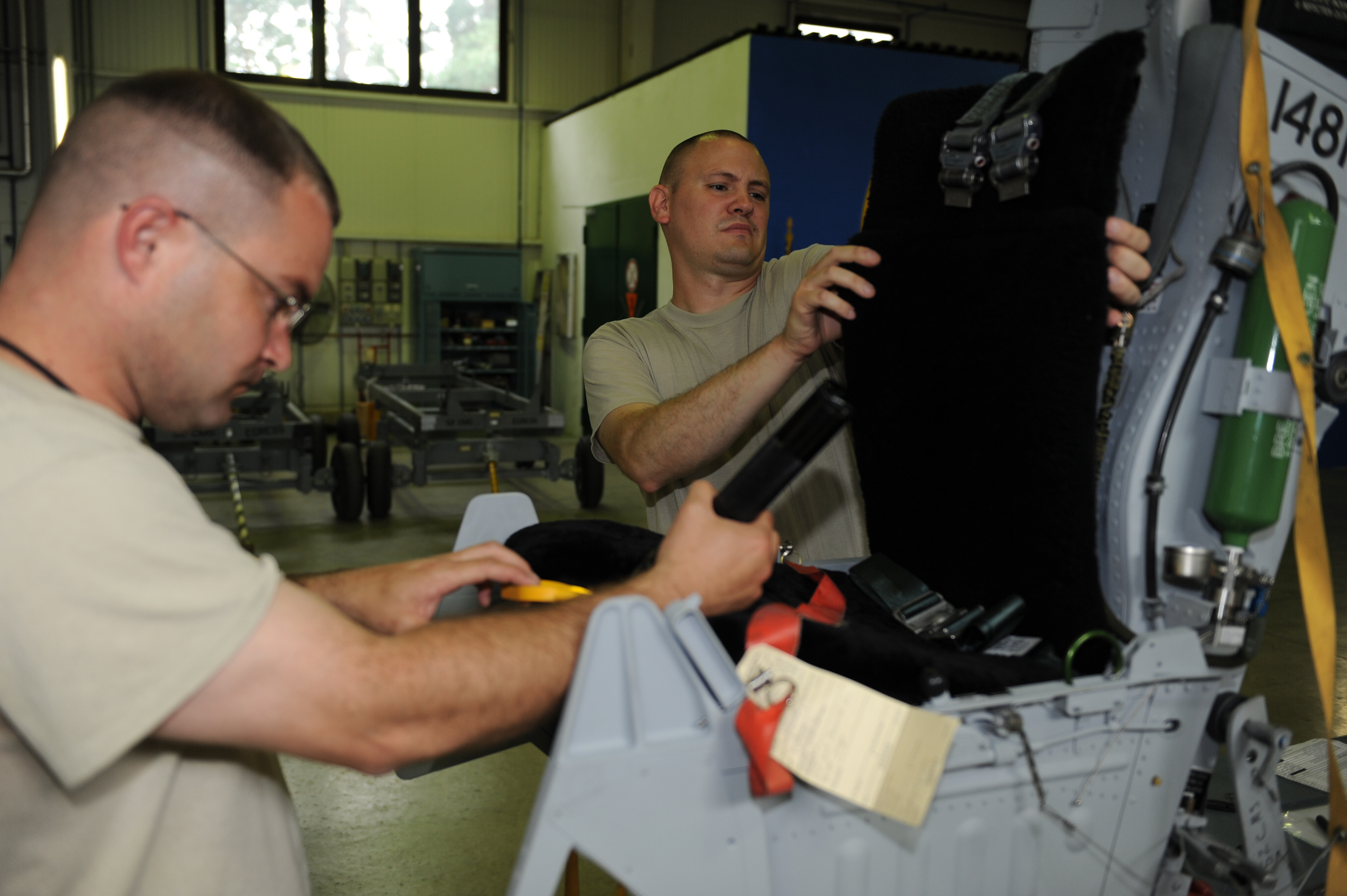 Emergency exit: Aircrew egress system technicians ensure pilot safety ...