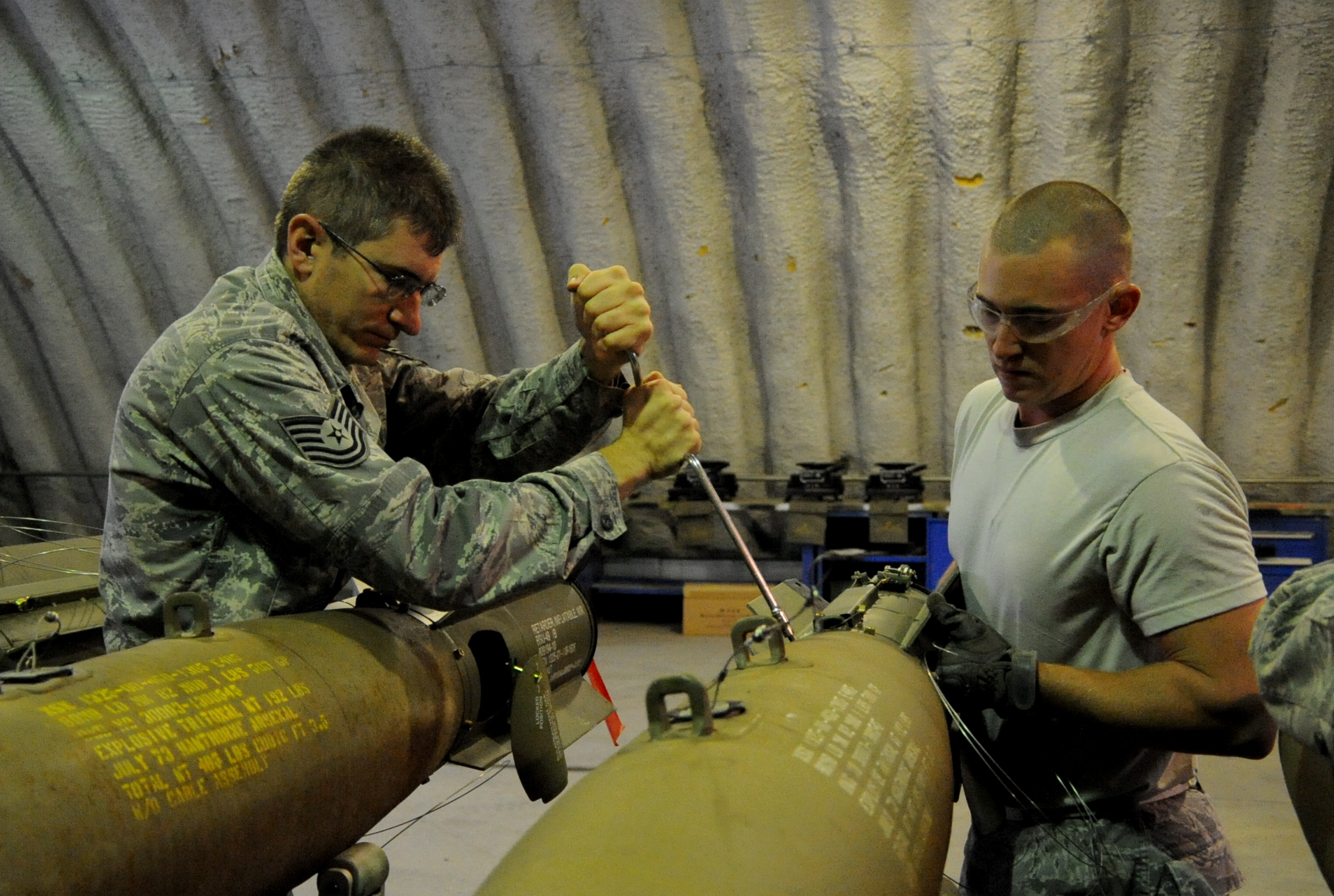 Ammo Airmen build bombs > 442d Fighter Wing > Article Display