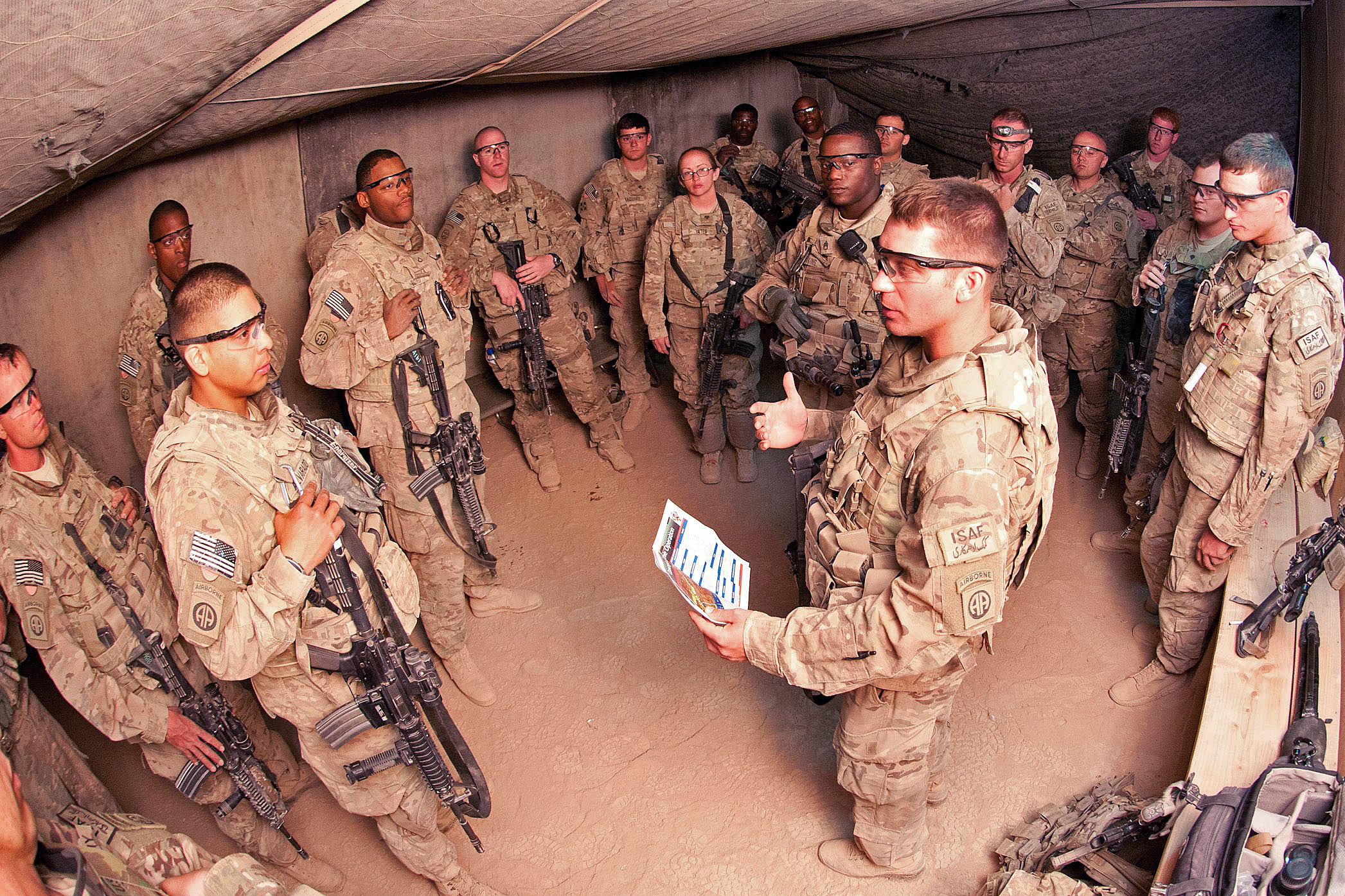 U.S. Army Second Lt. Mark Lucas briefs his soldiers before a combat ...