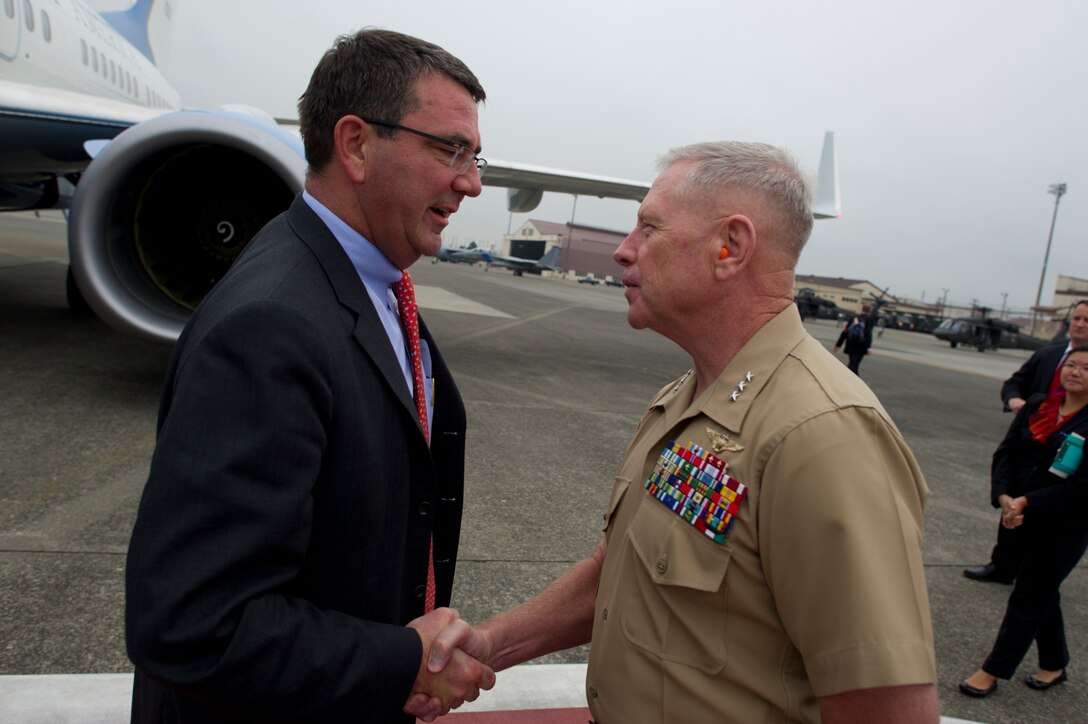 U.S. Deputy Defense Secretary Ashton B. Carter greets U.S. Marine Corps ...