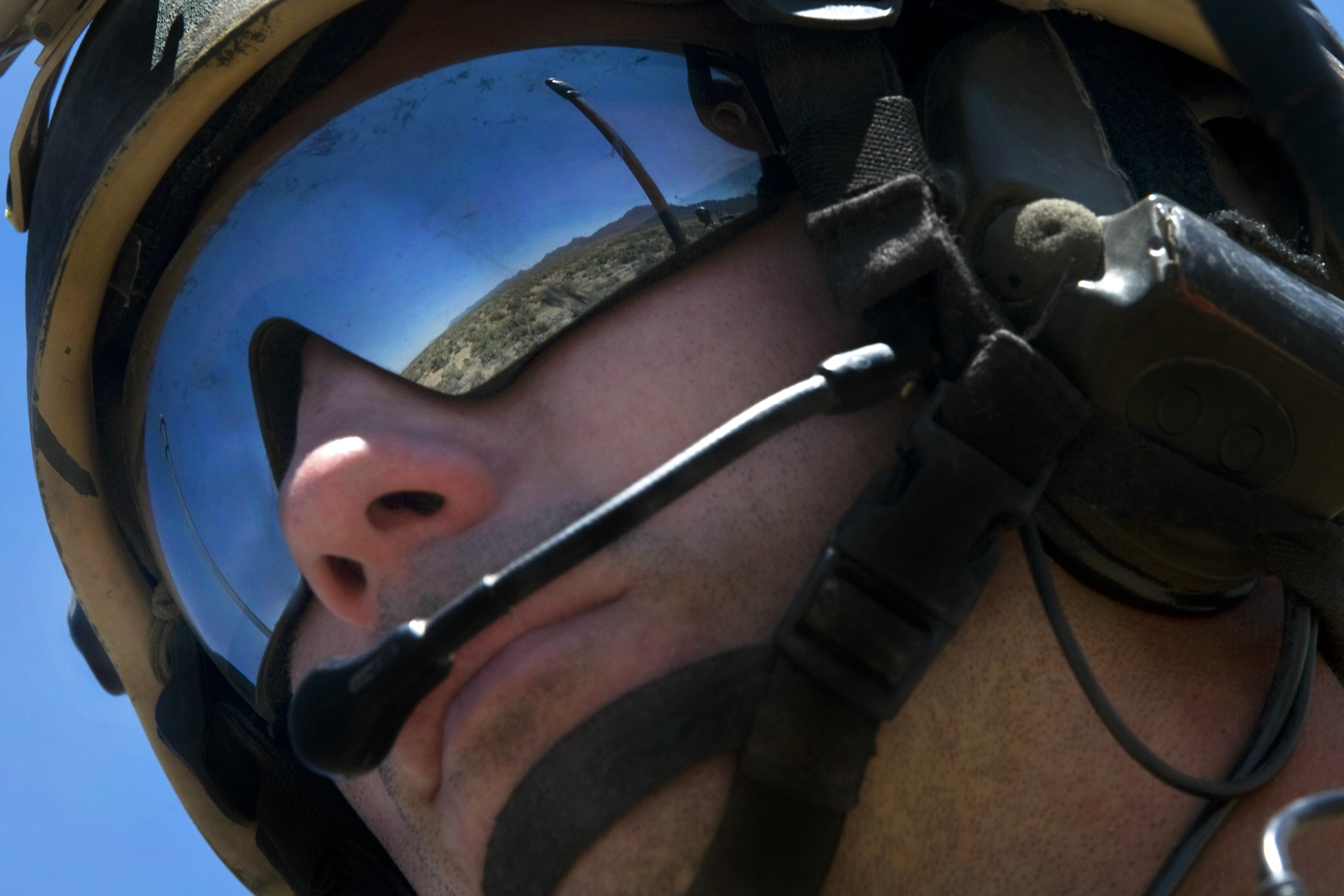 Air Force Staff Sgt. Colby Fulton looks over the range for C-130 ...