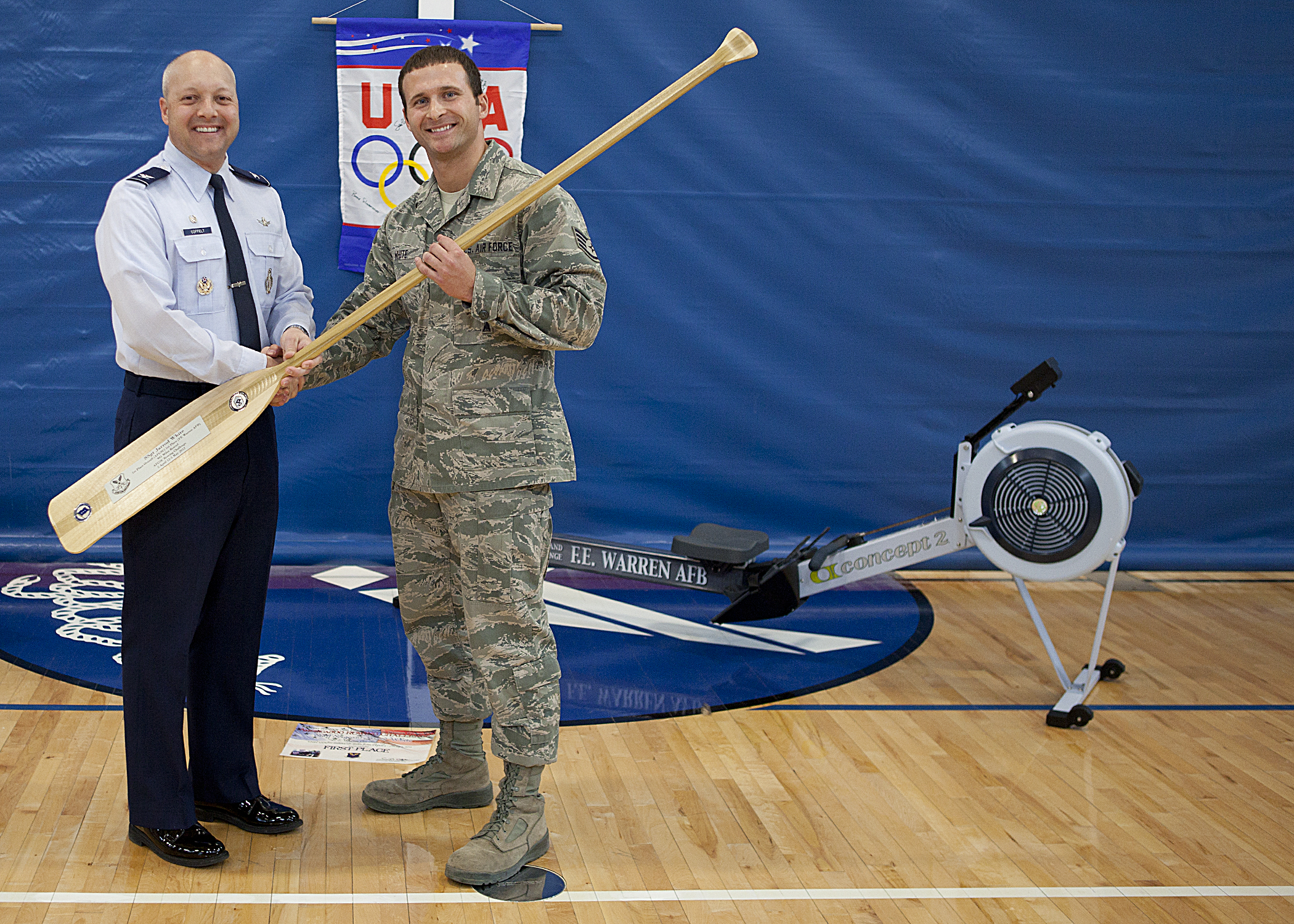 Missile maintenance instructor presented with trophy for rowing nearly ...