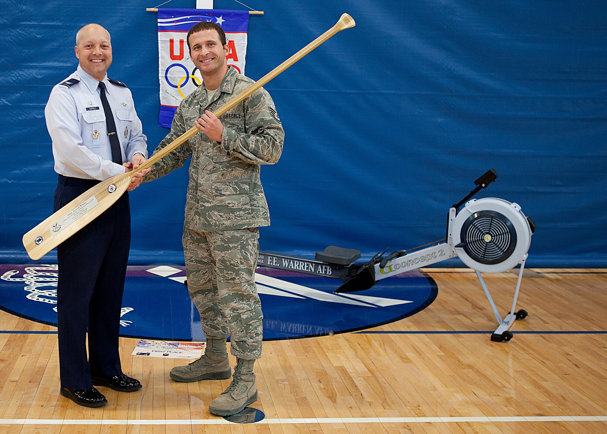 Missile maintenance instructor presented with trophy for rowing nearly ...