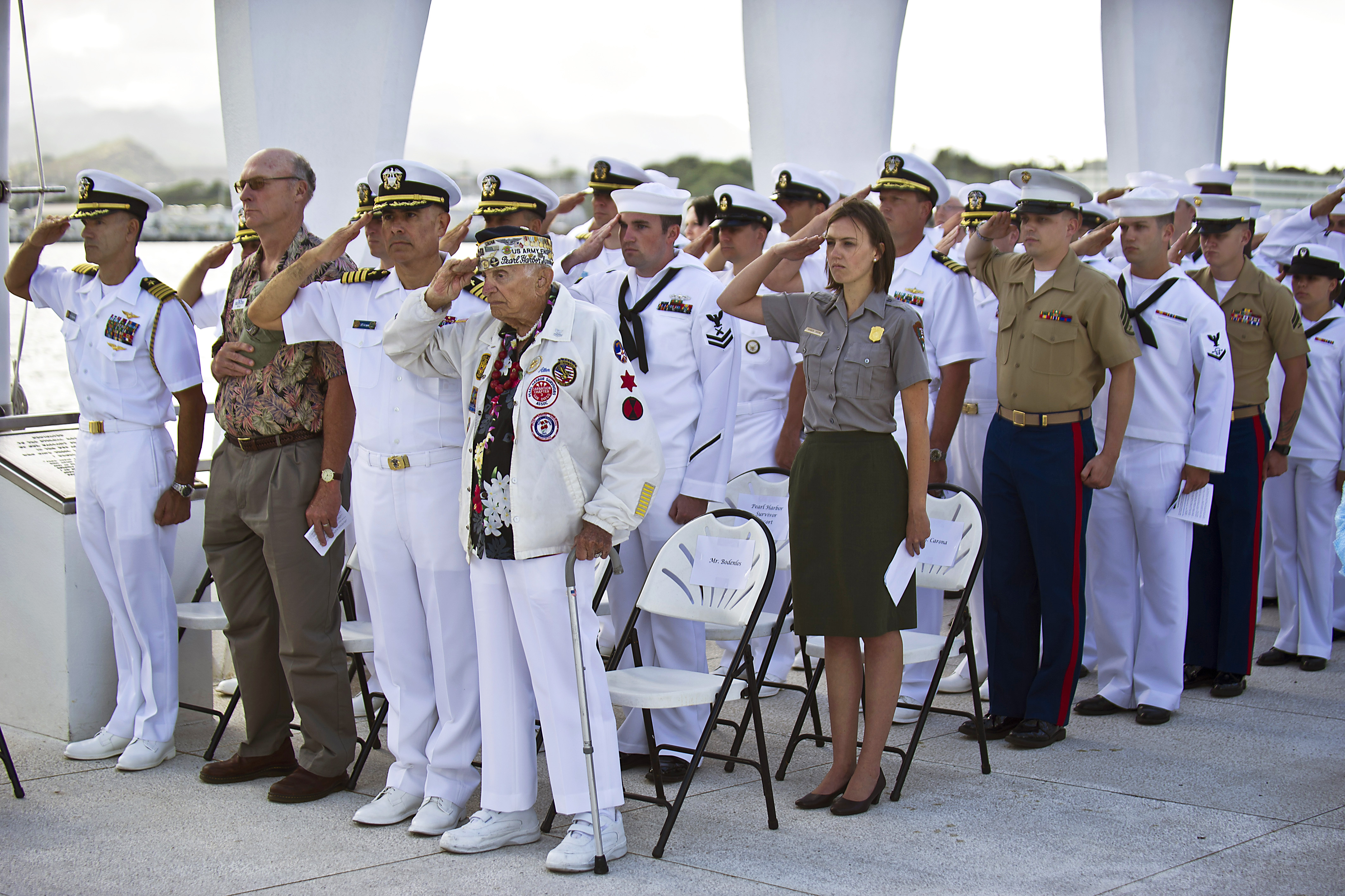 World War II veterans, civilian guests, sailors, Marines and airmen ...