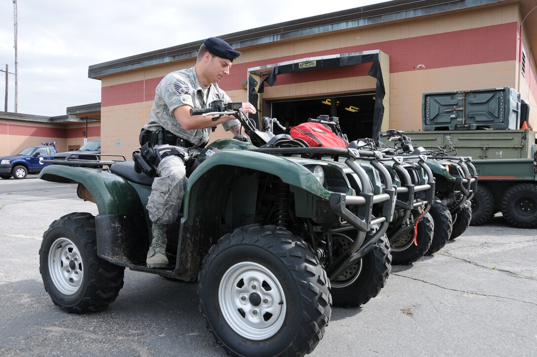Security Forces Perform ATV Maintenance Checks