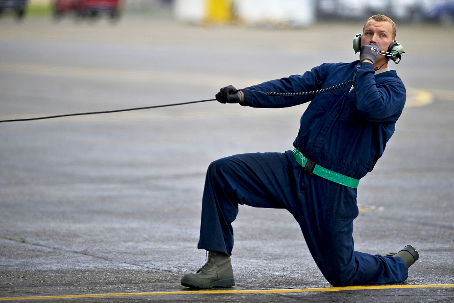 U.S. Air Force Senior Airman Marc Rosenberg conducts preflight checks ...