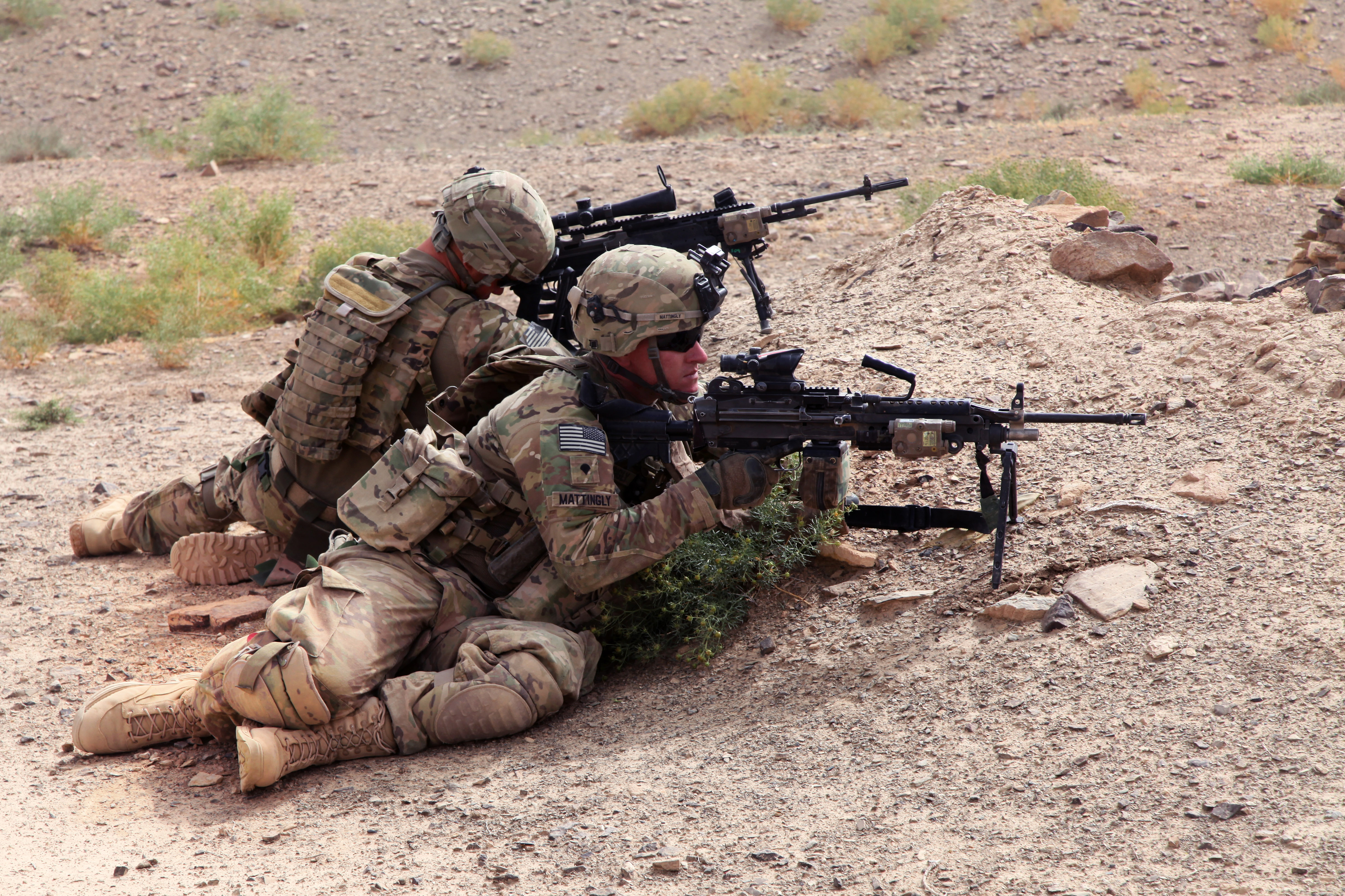 U.S. soldiers provide security at an overwatch position during ...