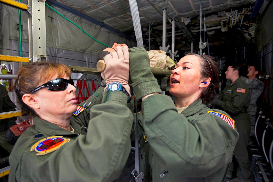 Air Force Lt. Col. Martha Maddox, left, and Tech. Sgt. Nicolette ...