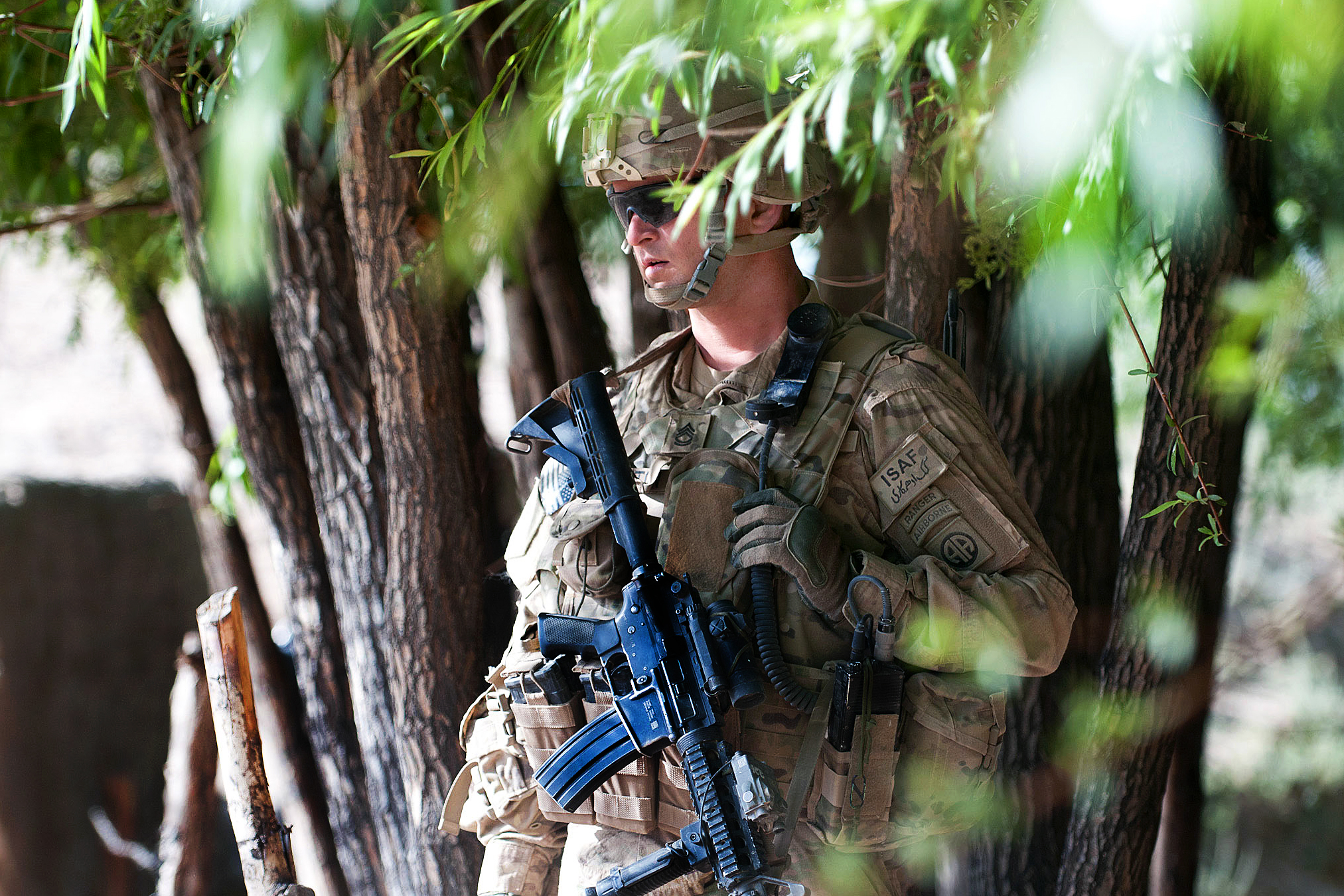 U.S. Army Sgt. 1st Class Christopher Caston scans the horizon before ...