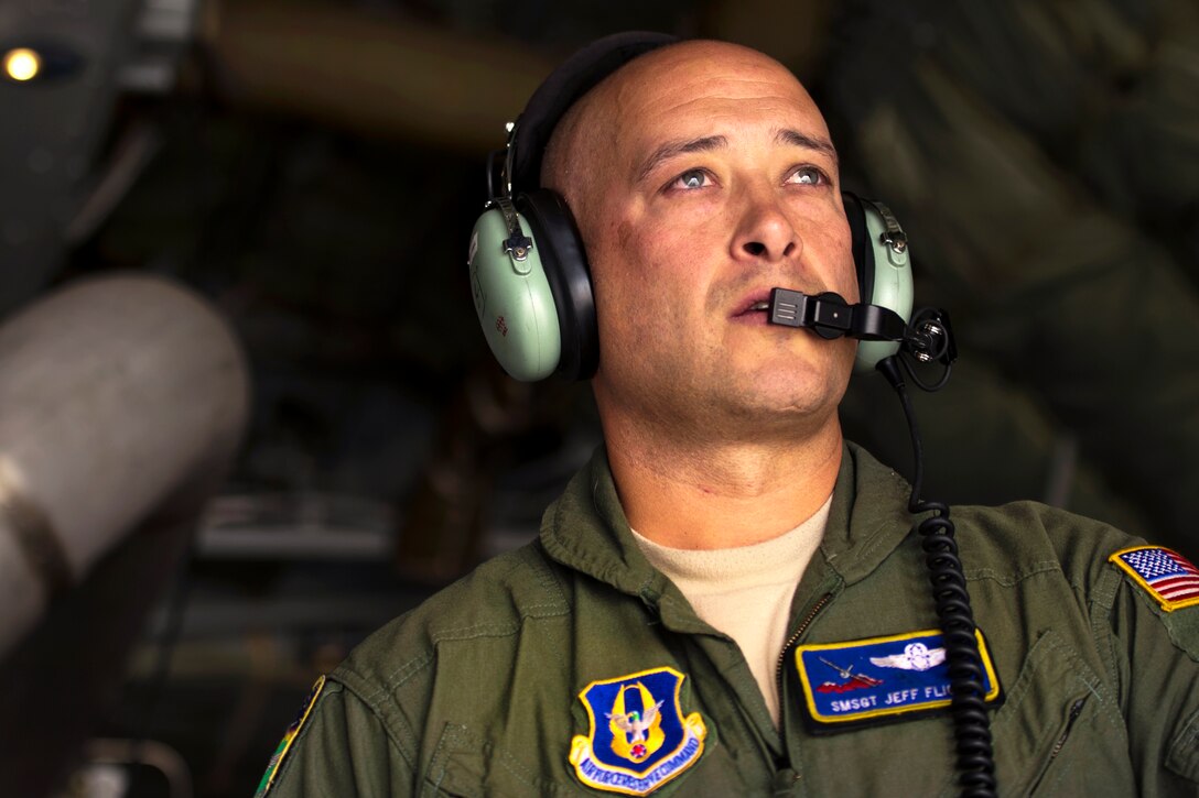 Air Force Senior Master Sgt. Jeff Flight prepares for take off in a C ...