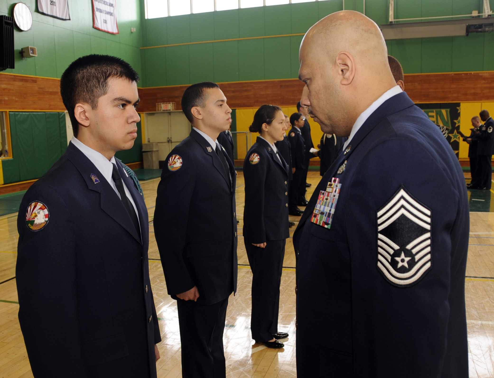 Present-day leaders inspect future leaders for the first time