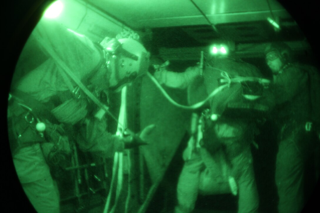 A Marine with U.S. Marine Corps Forces, Special Operations Command ...