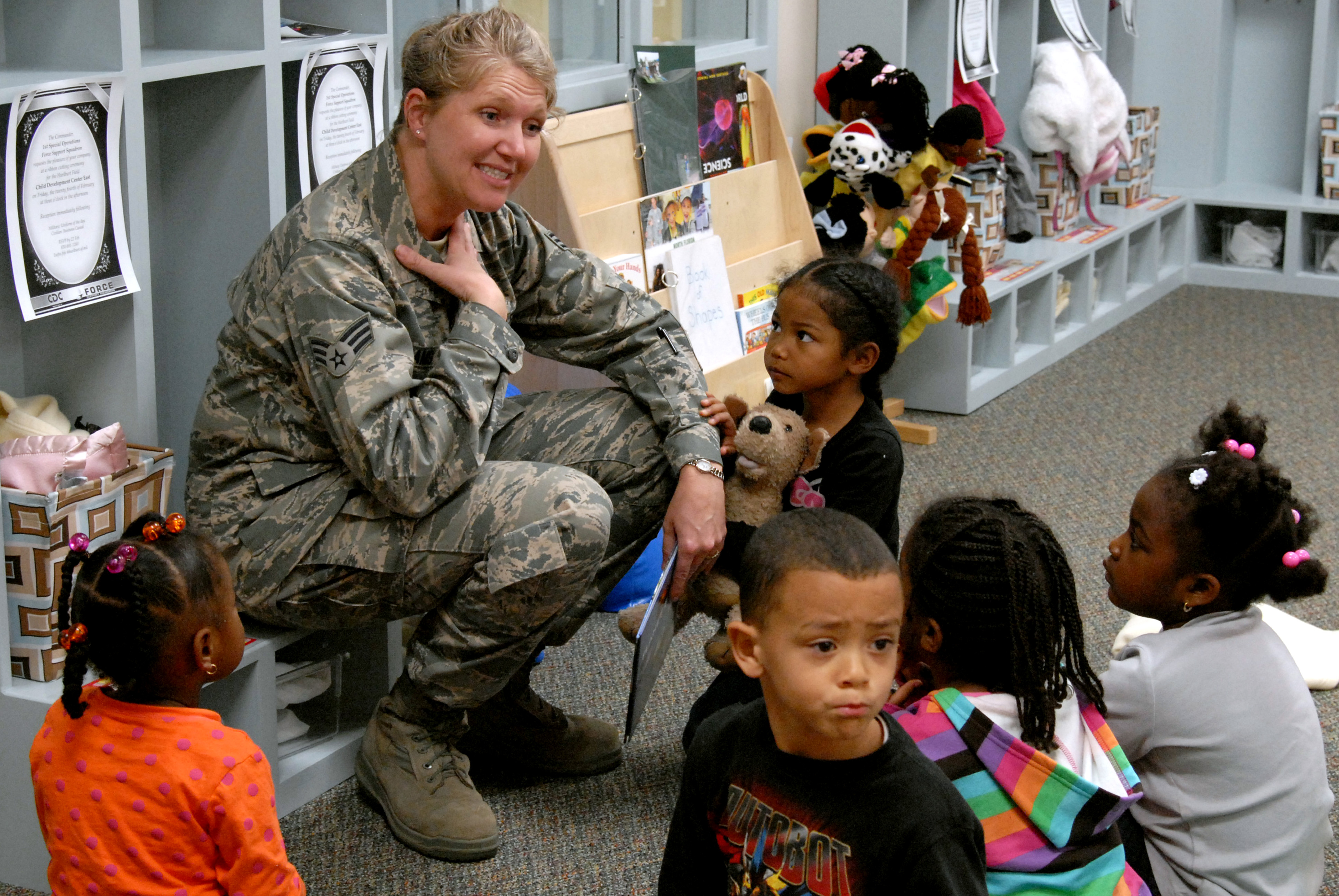 Senior Airman building block behind child development center