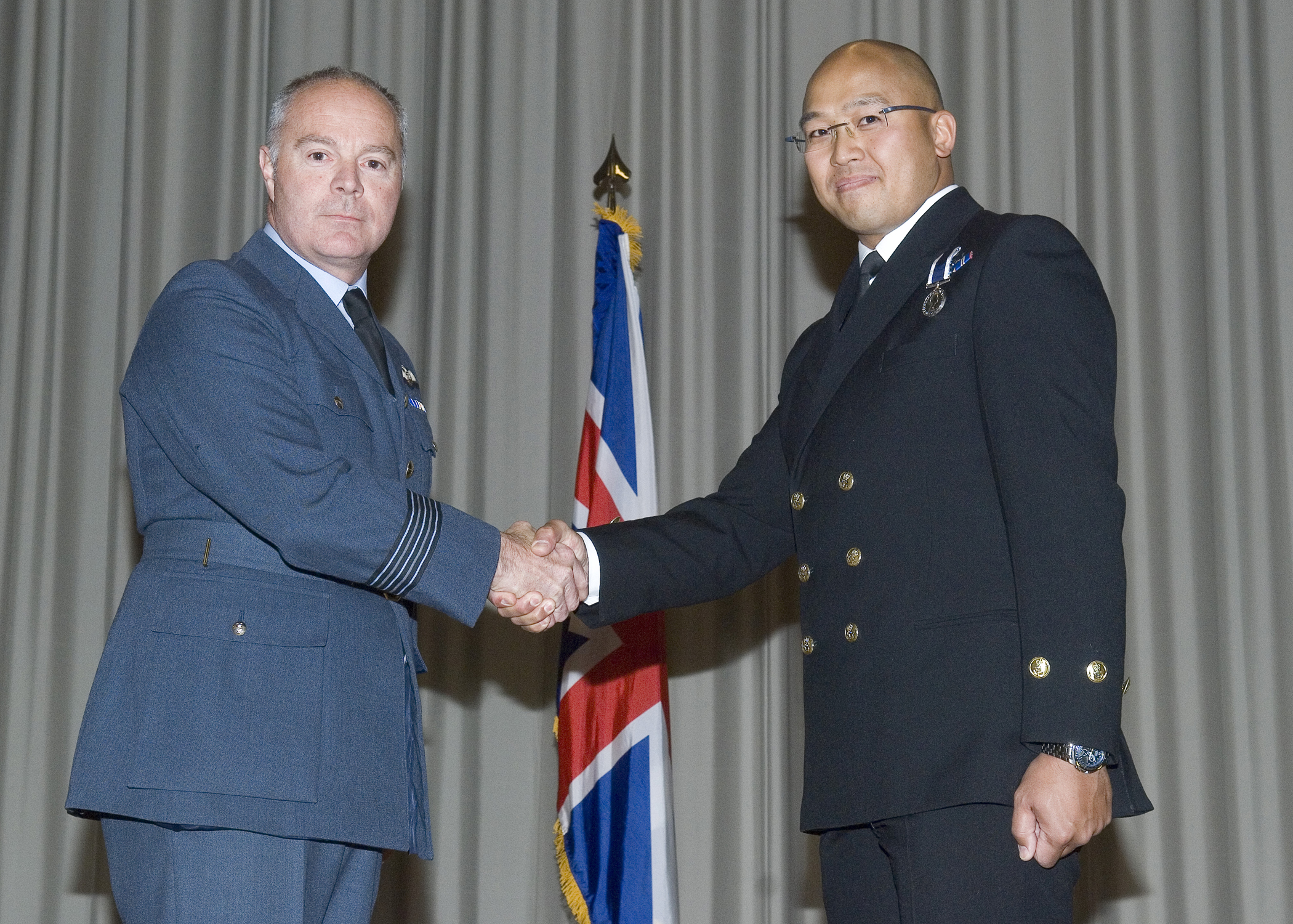UK Navy chief recognized at Team Edwards promotion ceremony > Edwards ...