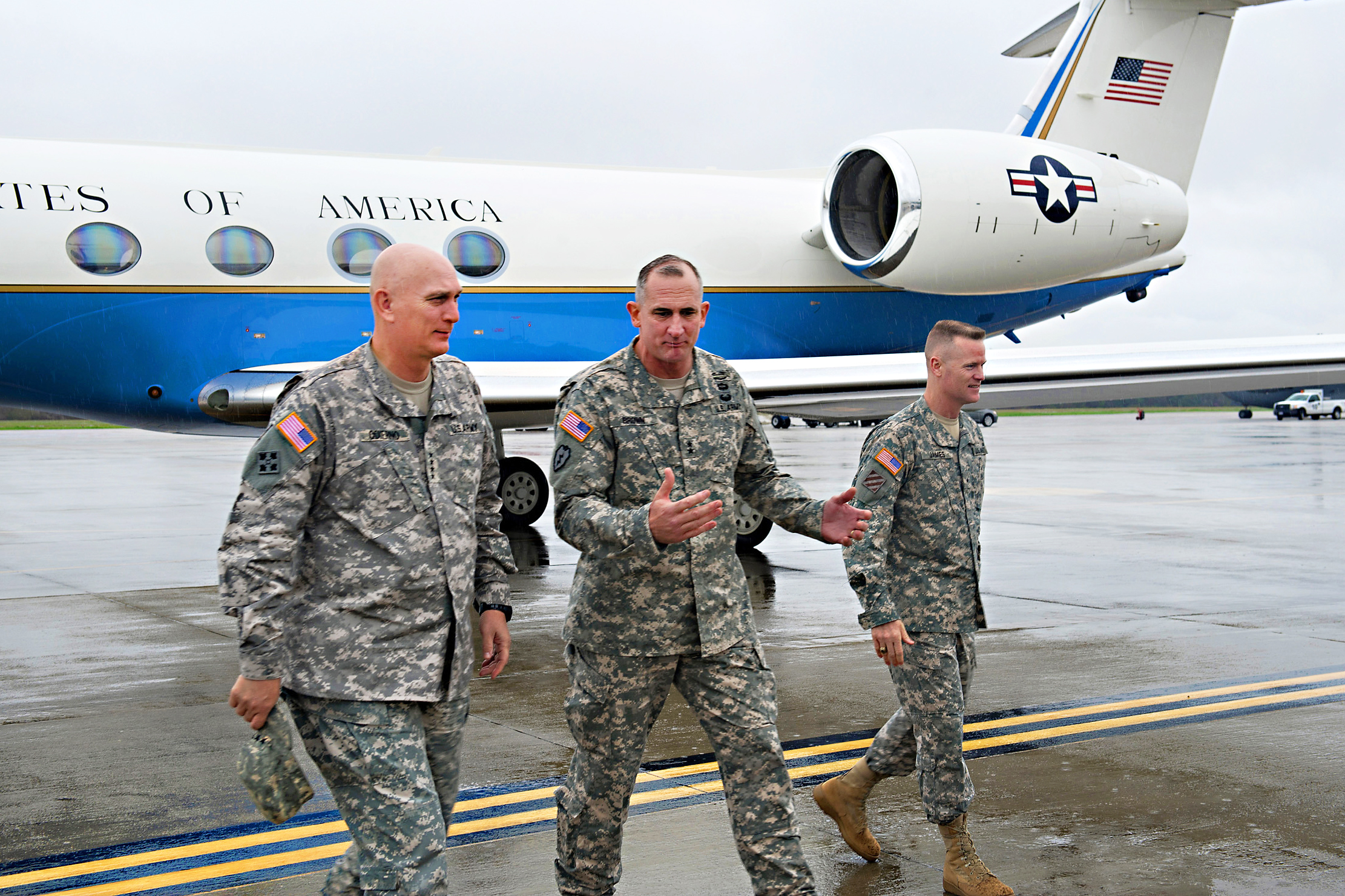 Army Maj. Gen. Robert B. Brown, center, commanding general of the U.S ...