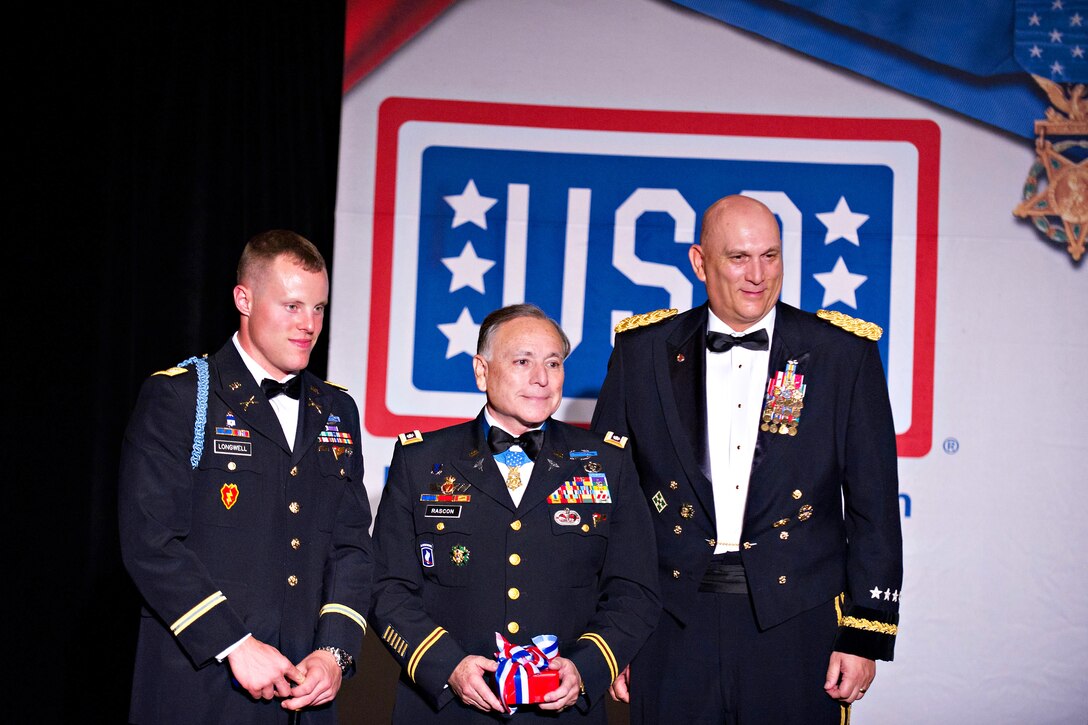 From left to right; Army Capt. William Longwell, Lt. Col. (ret.) Alfred ...