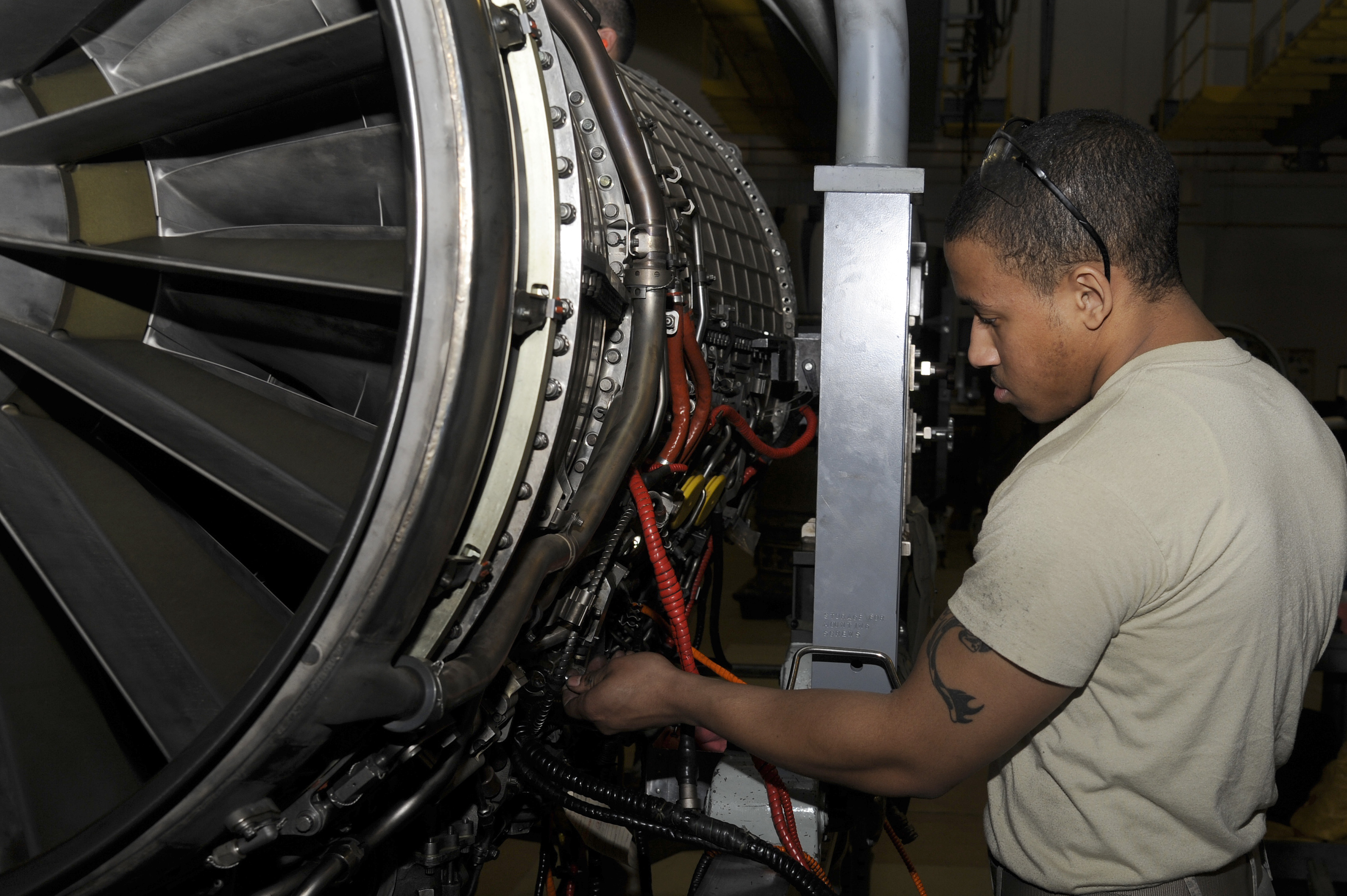 Maintainer for a day; CV trades flightsuit for coveralls