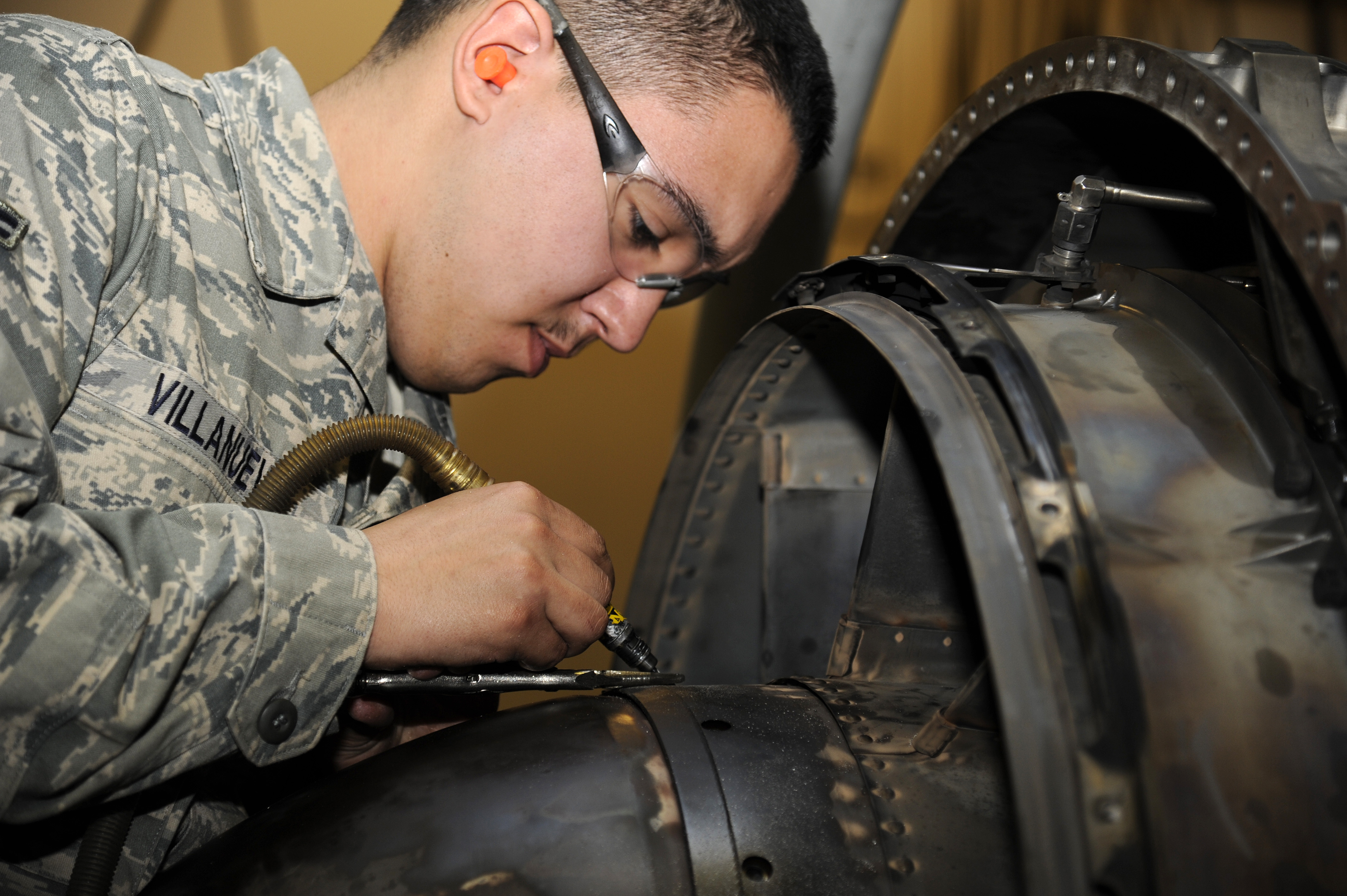 Maintainer for a day; CV trades flightsuit for coveralls