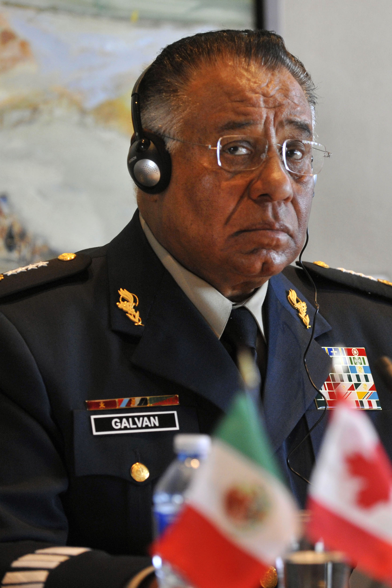 Mexican Defense Secretary Gen. Guillermo Galvan Galvan takes his seat ...