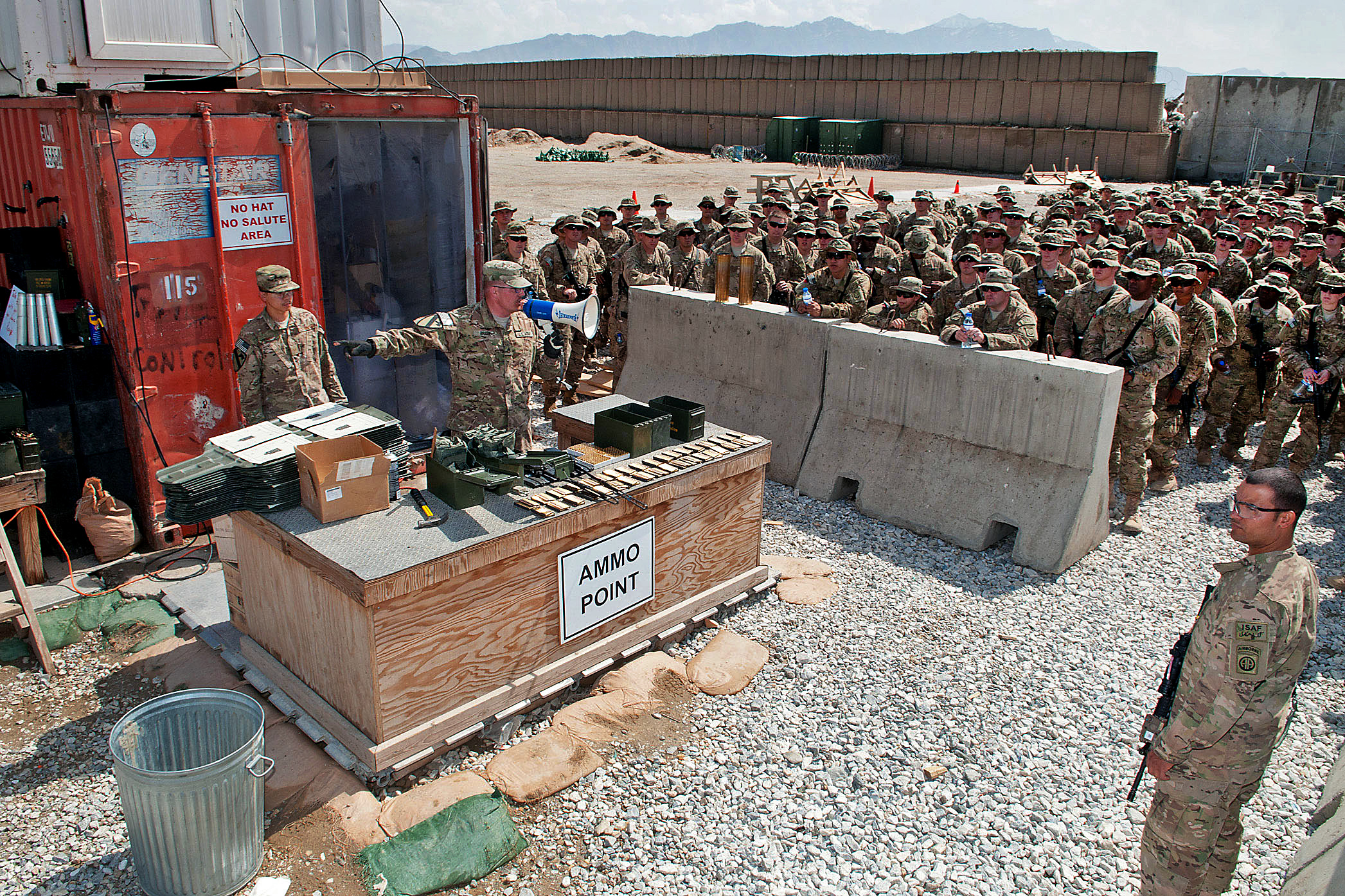 U.S. Army Sgt. 1st Class George Brace runs a weapons range for soldiers ...