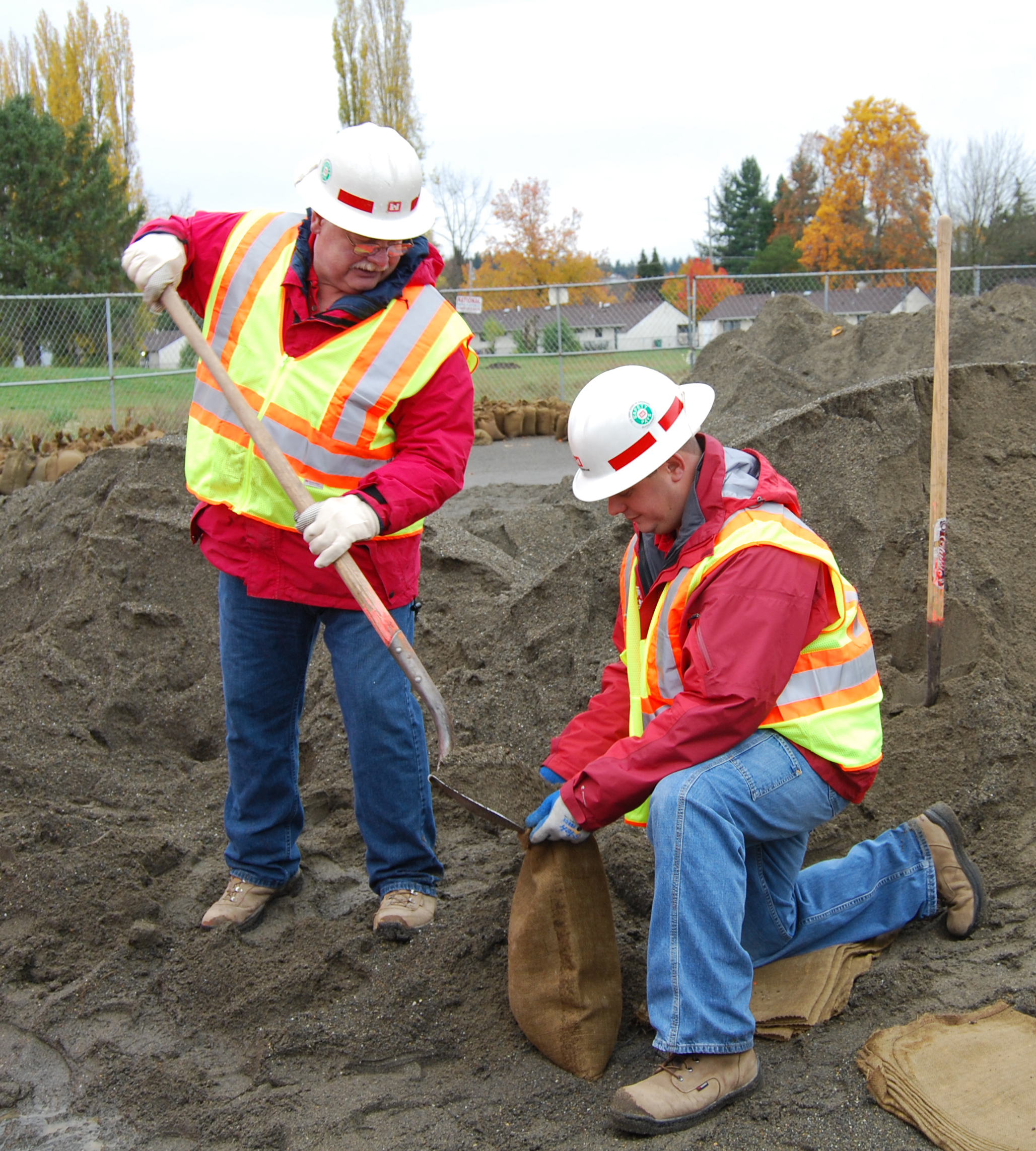 Emergency Management staff provide sandbag training to community members