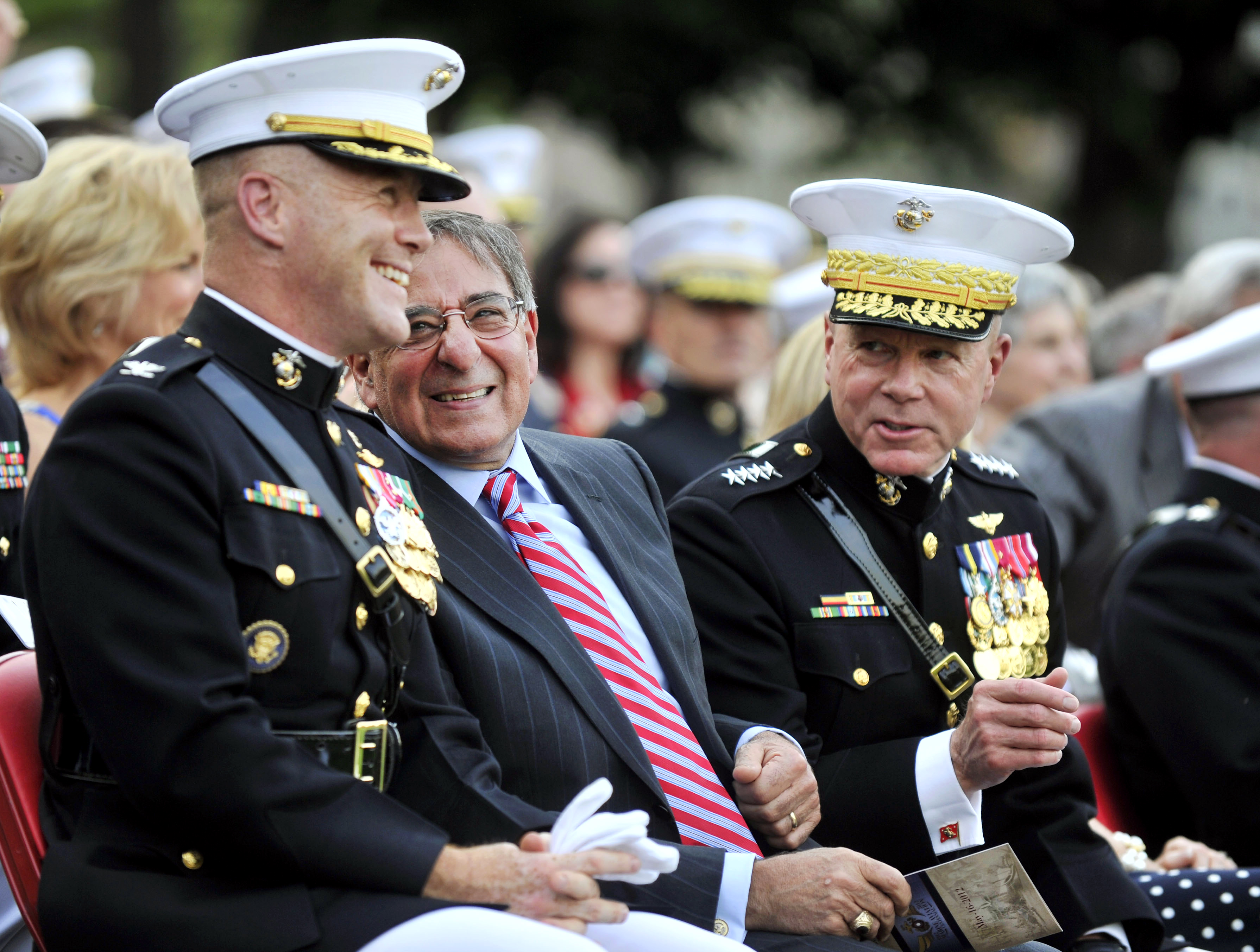 Defense Secretary Leon E. Panetta, center, visits with Marine Corps Col ...