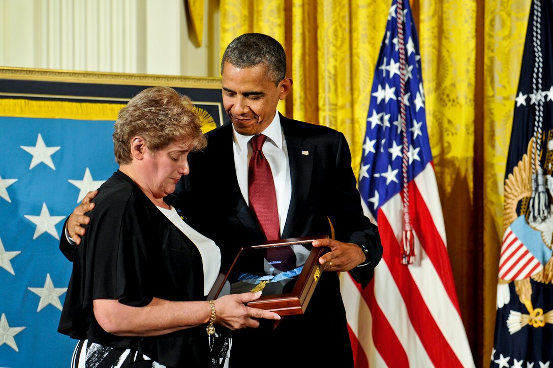 President Barack Obama awards the Medal of Honor posthumously to Army ...