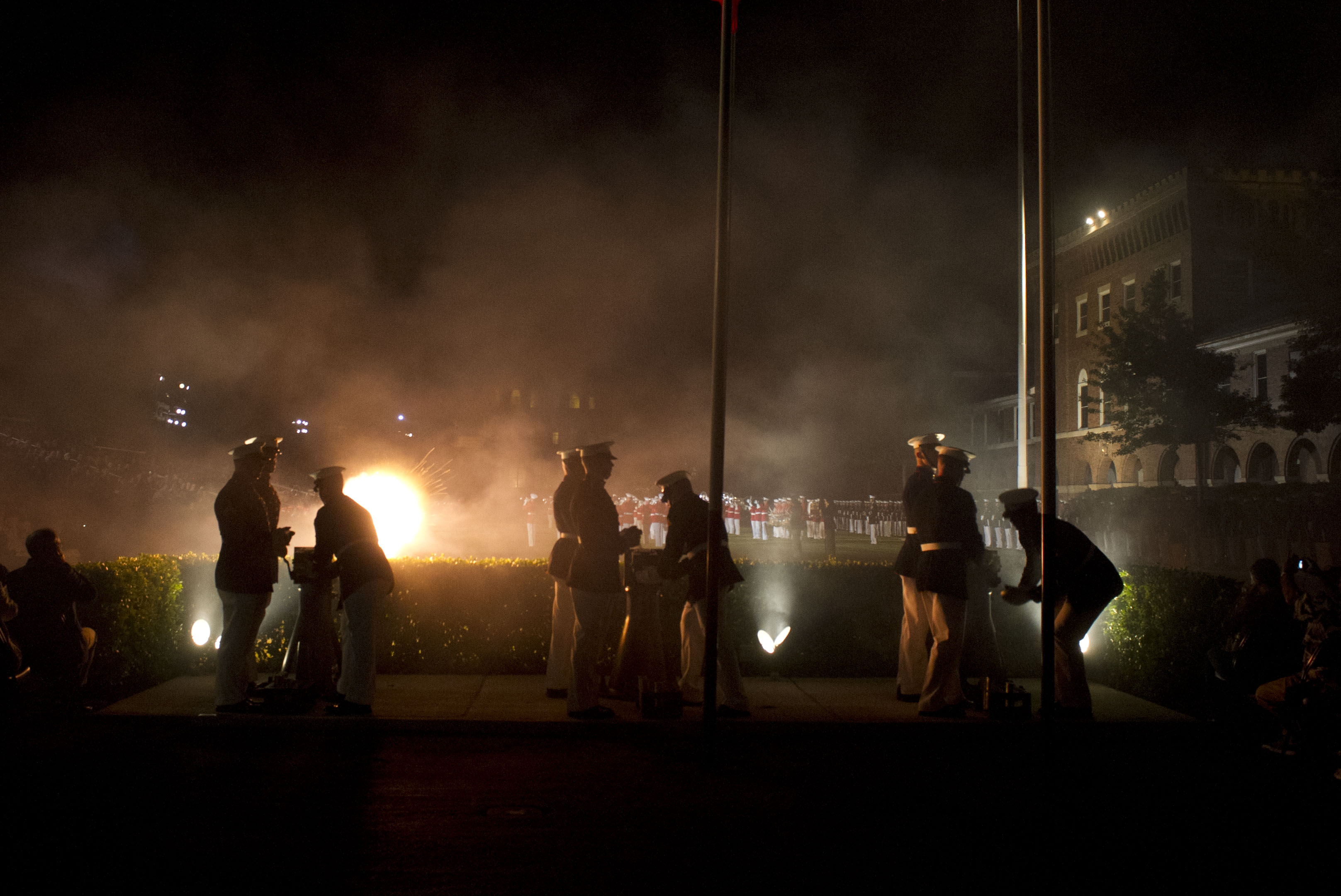 Marines fire ceremonial 40mm cannons during an evening parade in honor ...