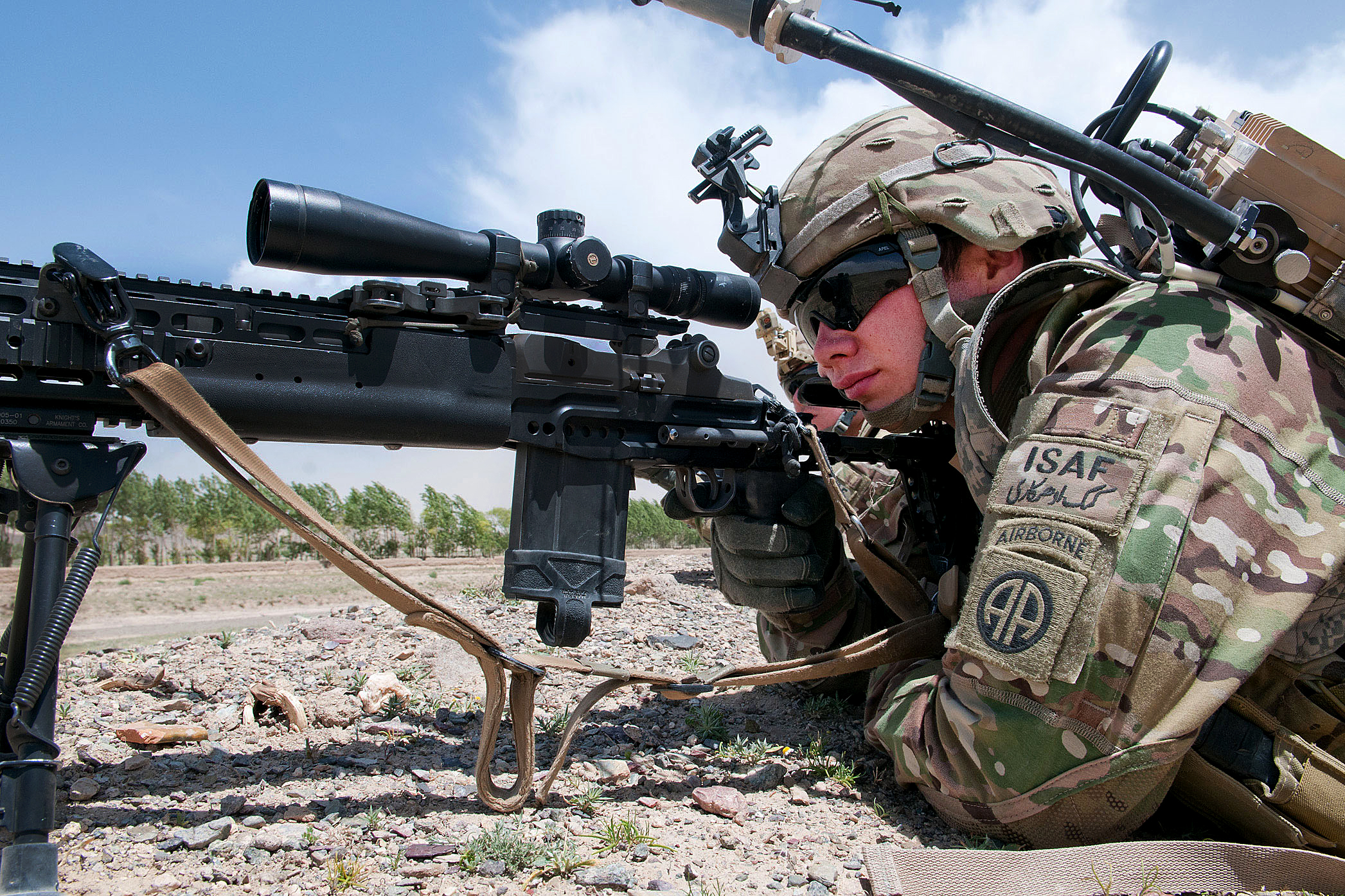 U.S. Army Pfc. James Burson secures his sector with an enhanced battle ...