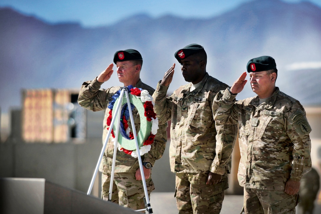 U.S. Army Command Sgt. Maj. Brian Edwards, right, U.S. Army Col ...