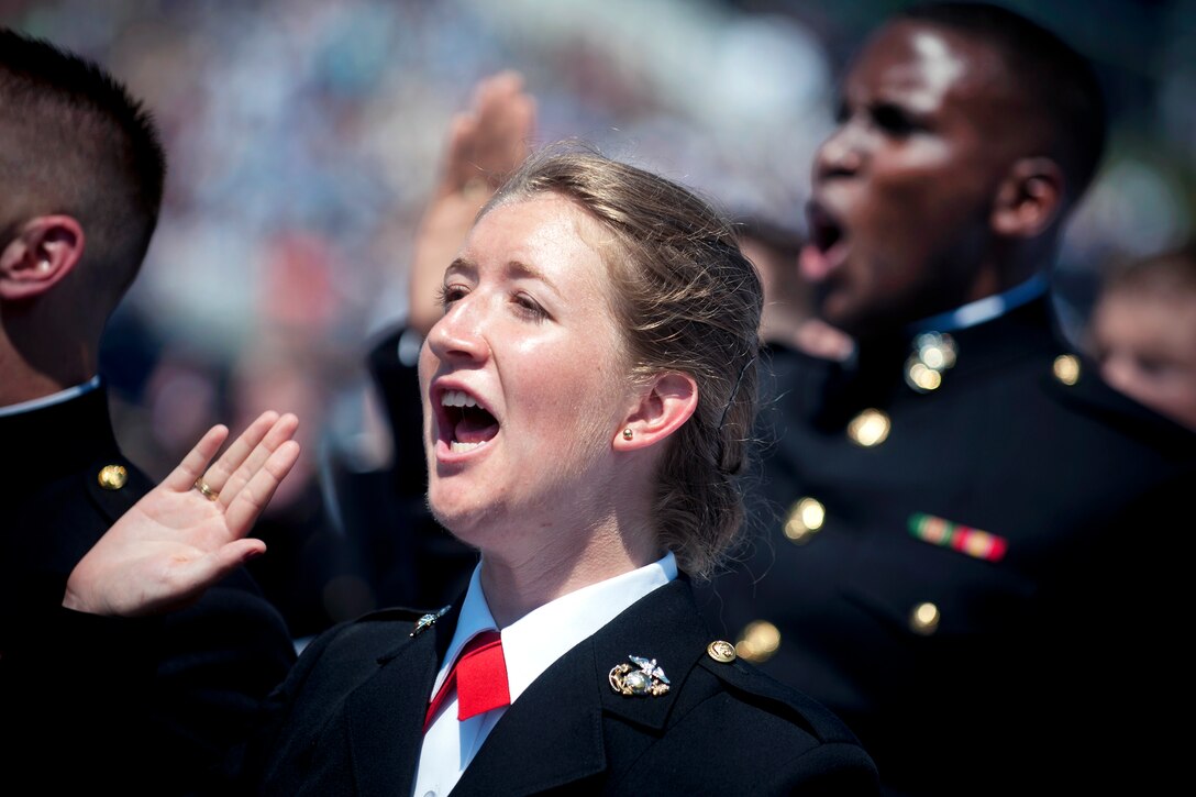 Graduating Midshipmen take the Oath of Office as they prepare to be ...