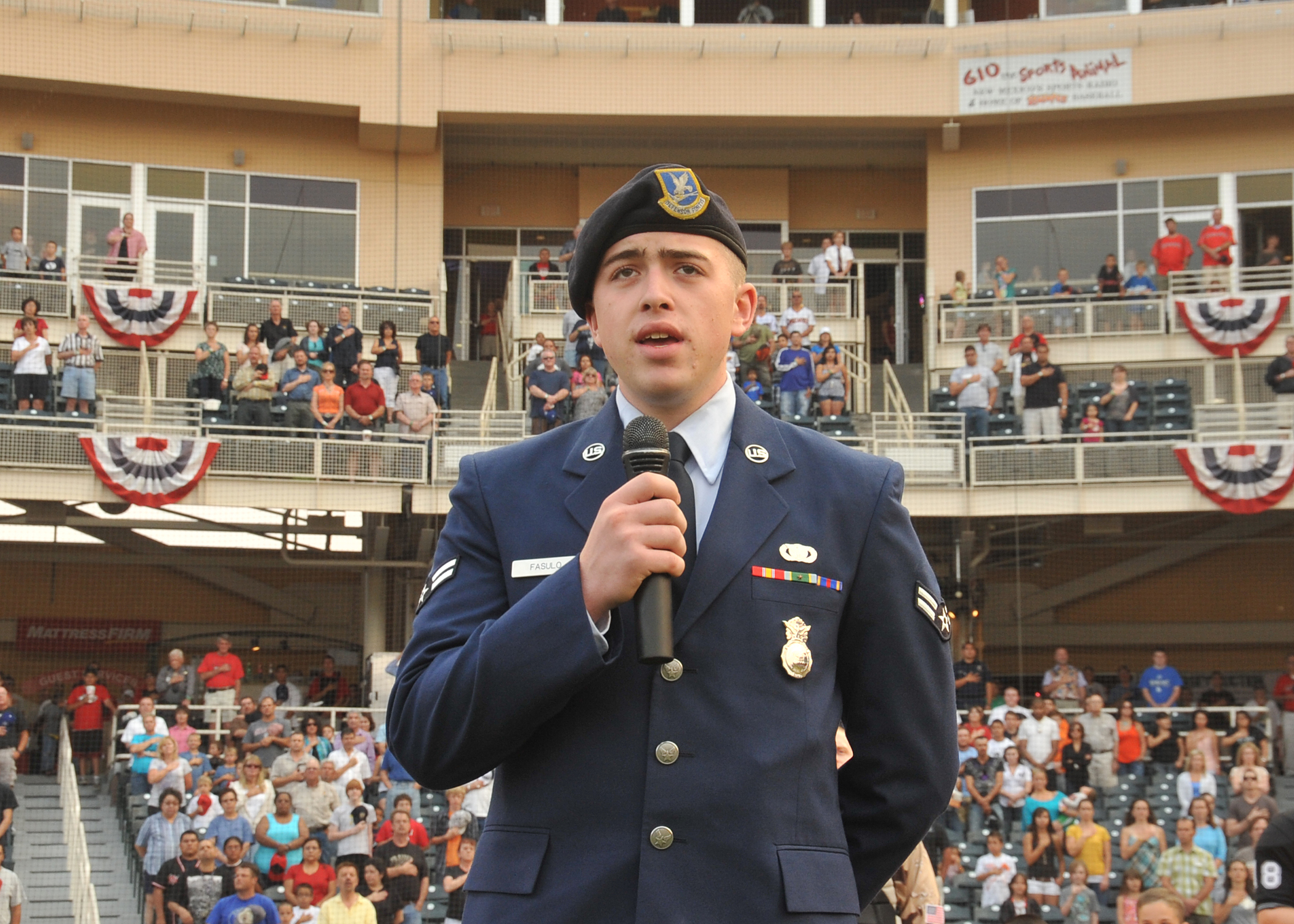 Airman sings Star-Spangled Banner