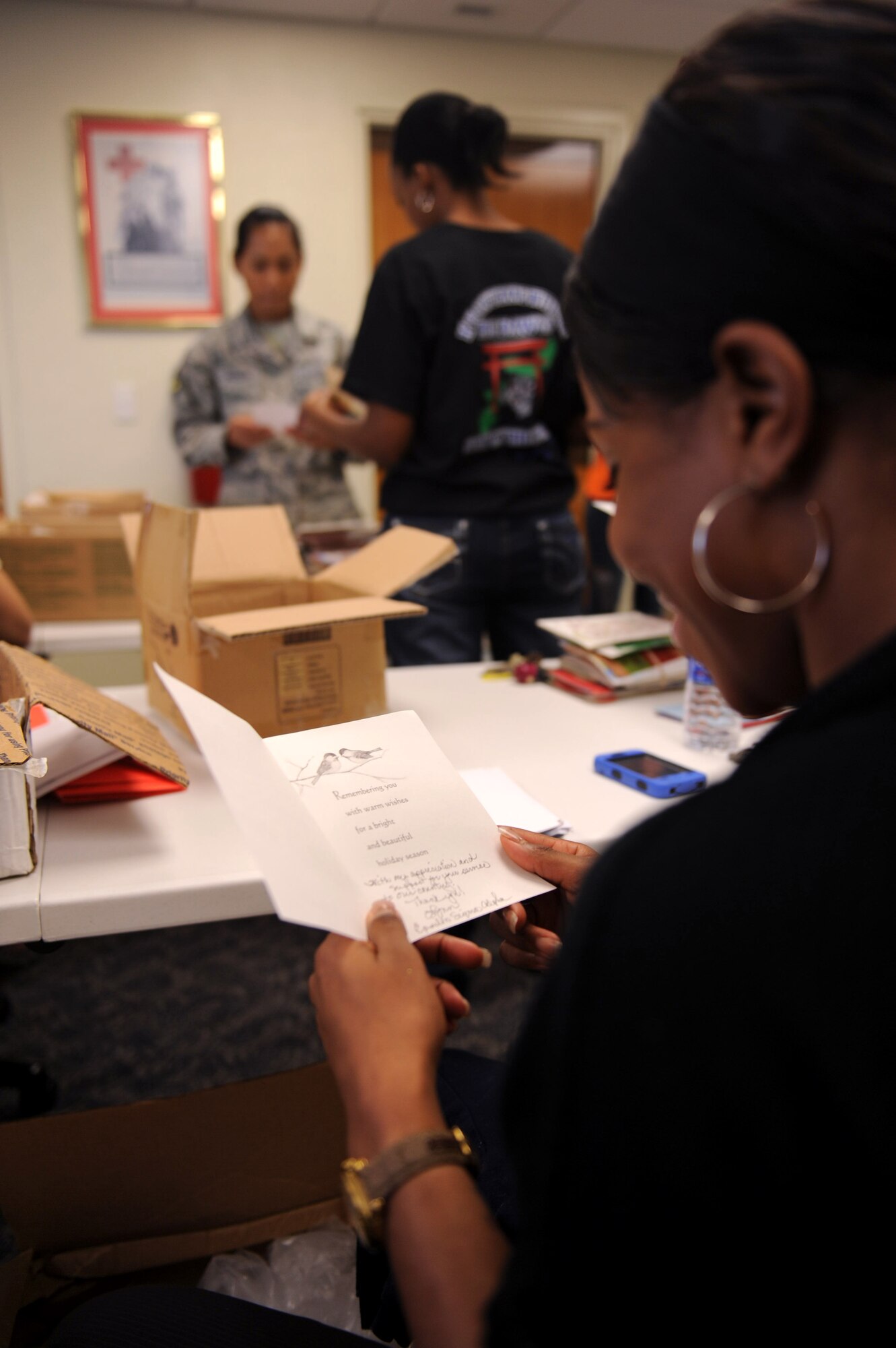 Red Cross volunteers screen holiday cards for Airmen > Kadena Air Base ...