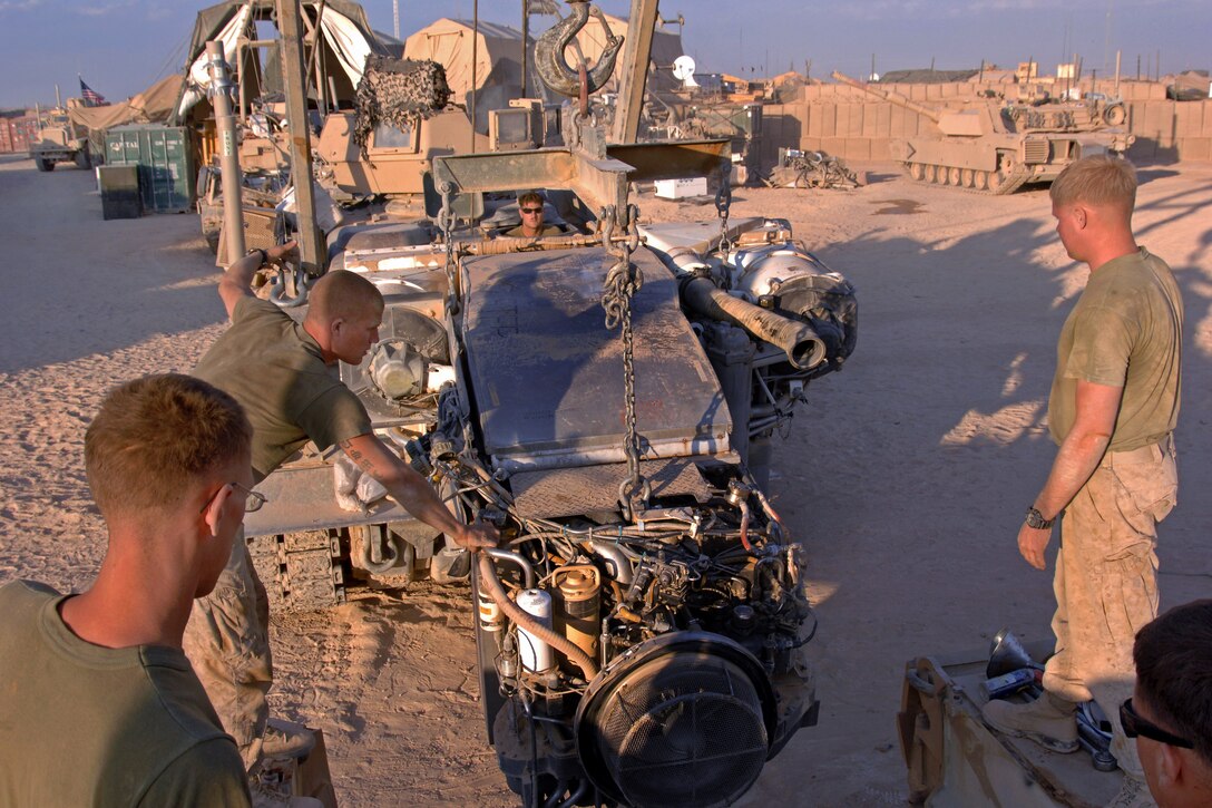 U.S. Marine Corps Lance Cpl. Joe Shilen operates a M88A2 Hercules ...