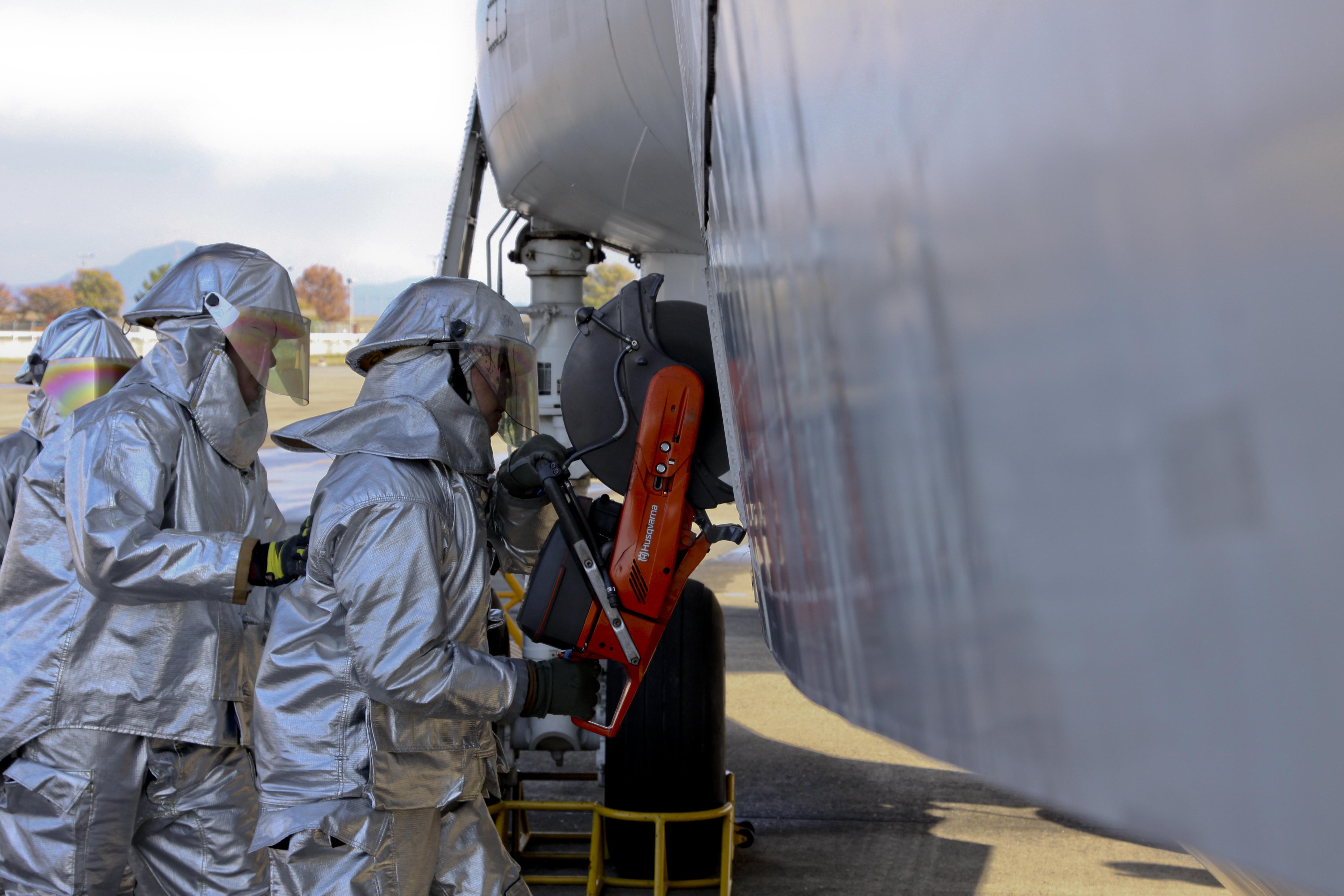 ARFF, station firefighters, JMSDF hose down some training