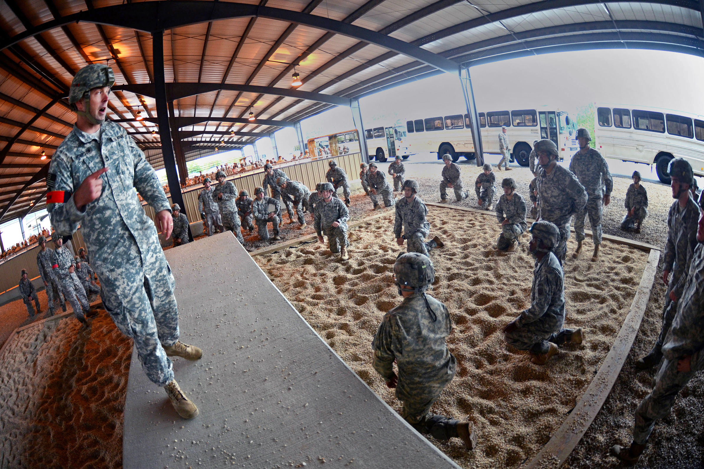 A jumpmaster conducts sustained airborne training for his paratroopers ...