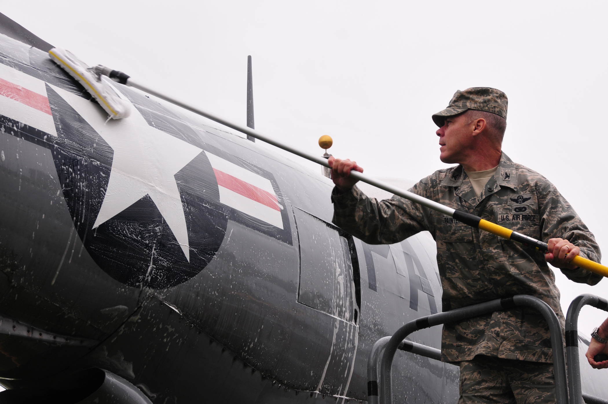 Unit members care for static display aircraft
