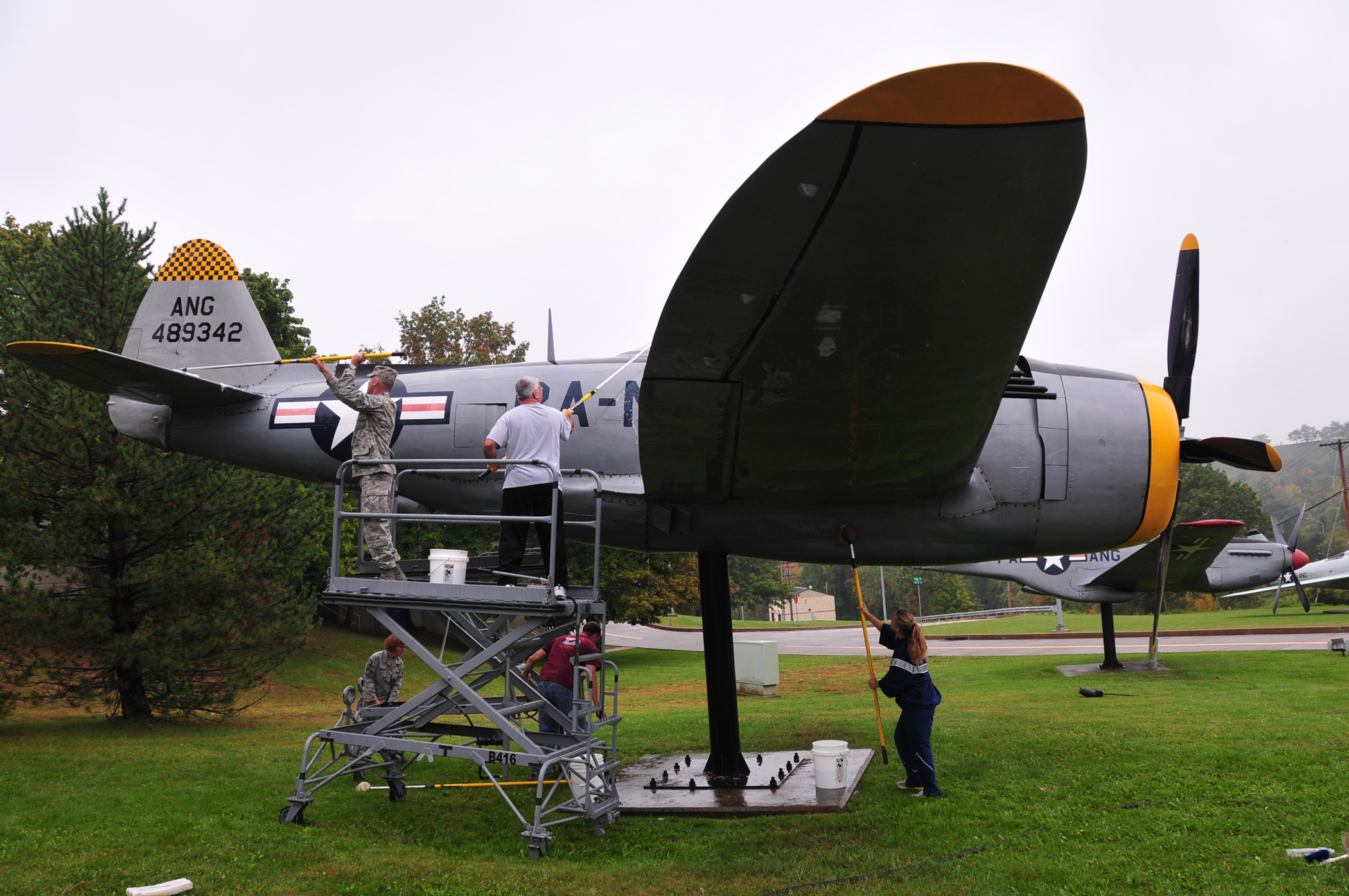 Unit members care for static display aircraft