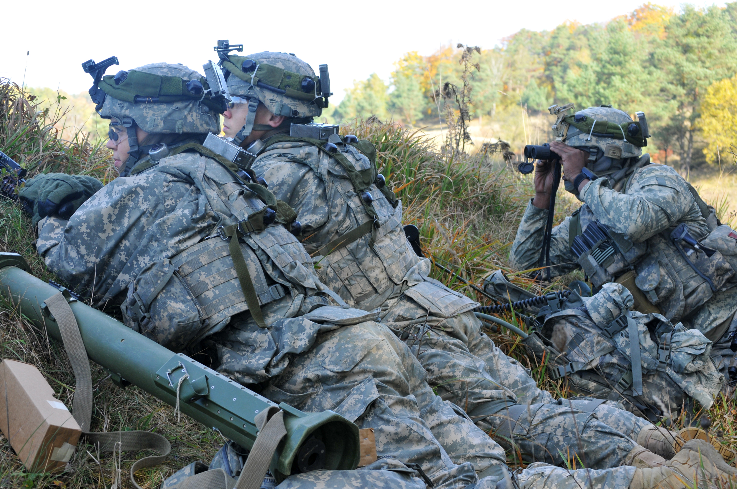 U.S. Army soldiers search for simulated enemy activity during a ...