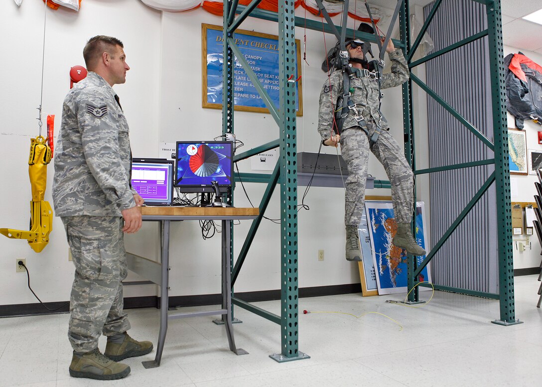 Edwards aircrew take virtual jump into parachute training