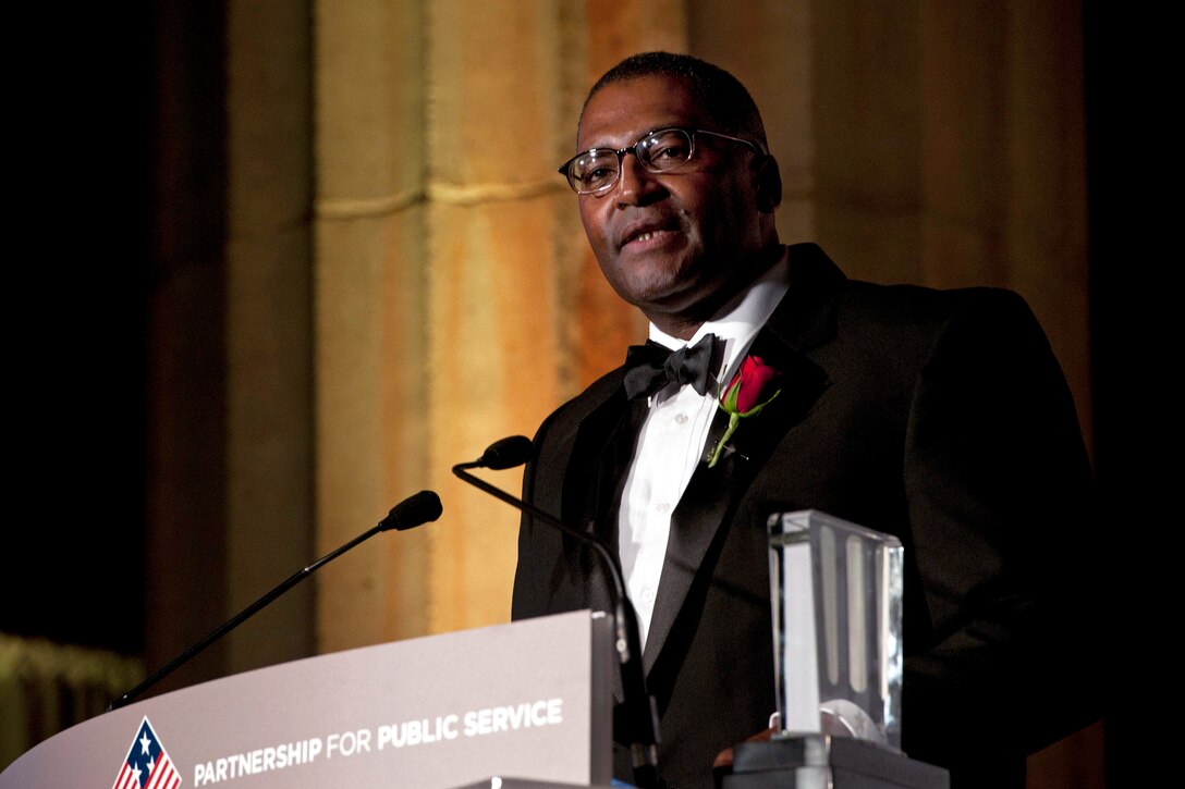 Elliot Branch speaks after being presented with the Management ...