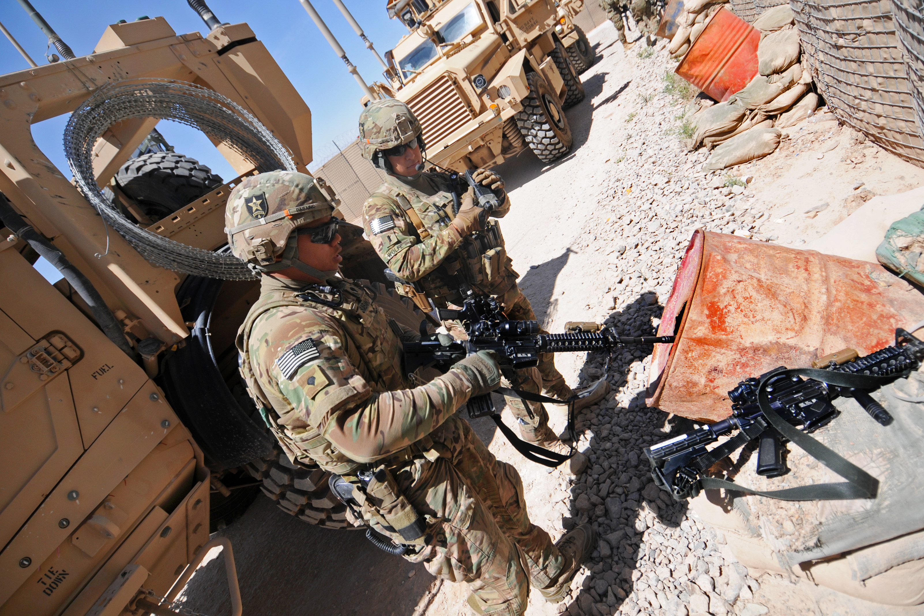U.S. Army Spc. Michael Rabaino, left, and U.S. Army 1st Lt. Robert ...