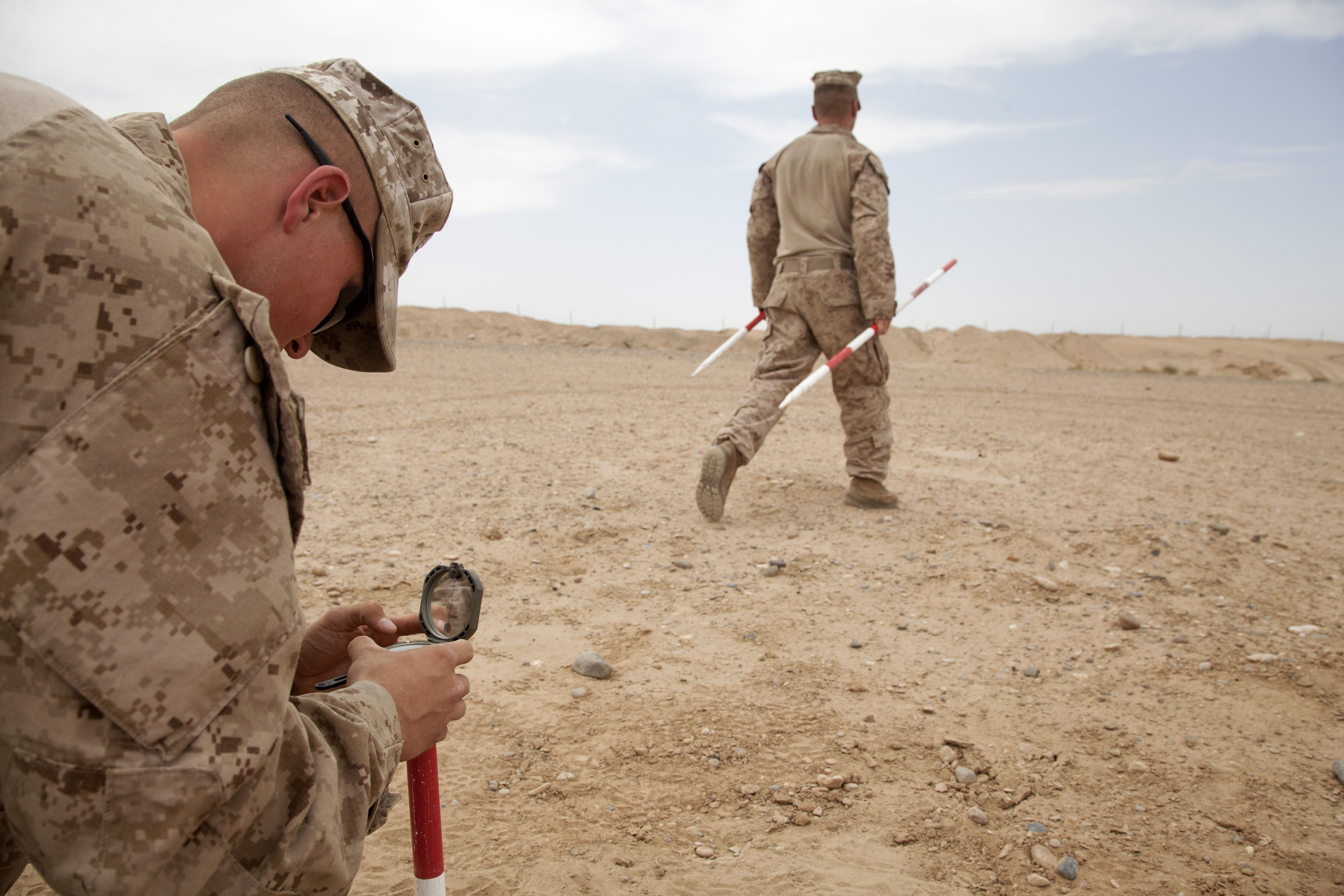 U.S. Marine Corps Lance Cpl. Dylan Vashey, left, a mortarman assigned ...