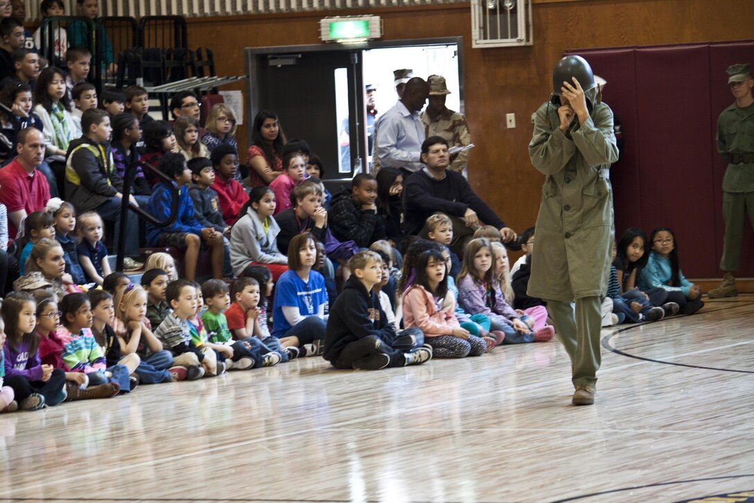 Marines display uniforms with pride for M. C. Perry youth